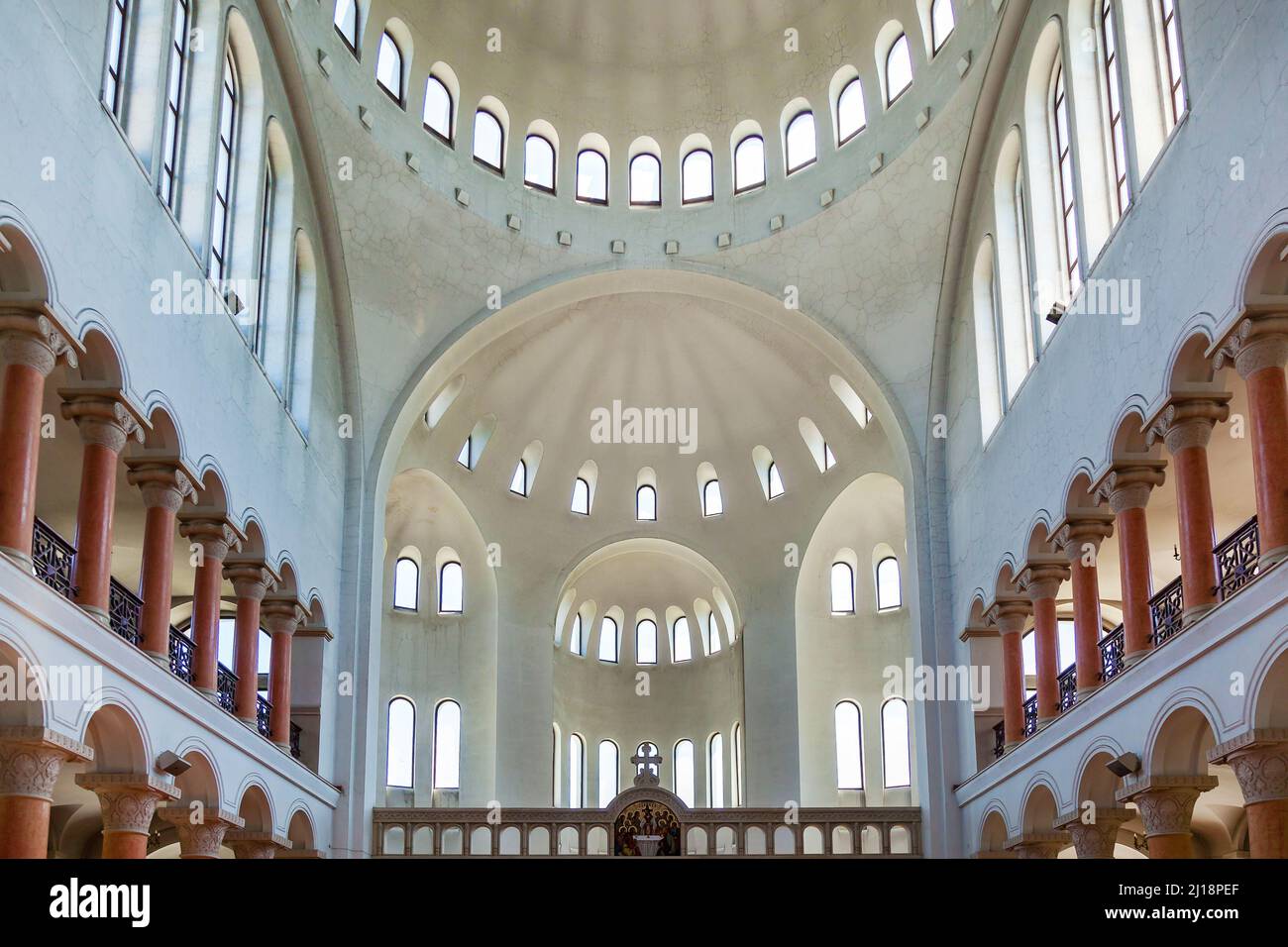 Interior of the church with columns and multiple windows Stock Photo ...