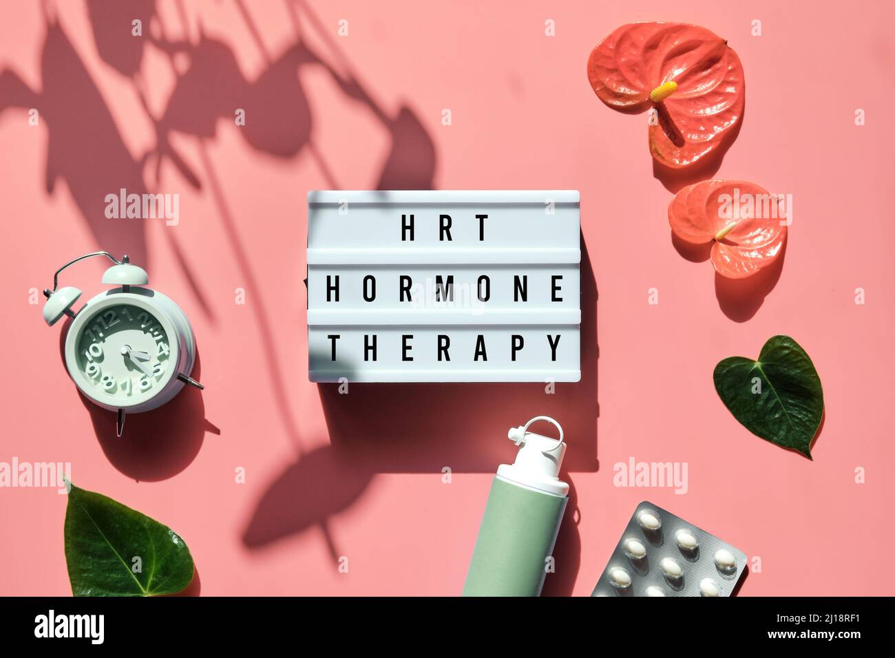 Text HRT Replacement Therapy on light box. Menopause, hormone therapy ...