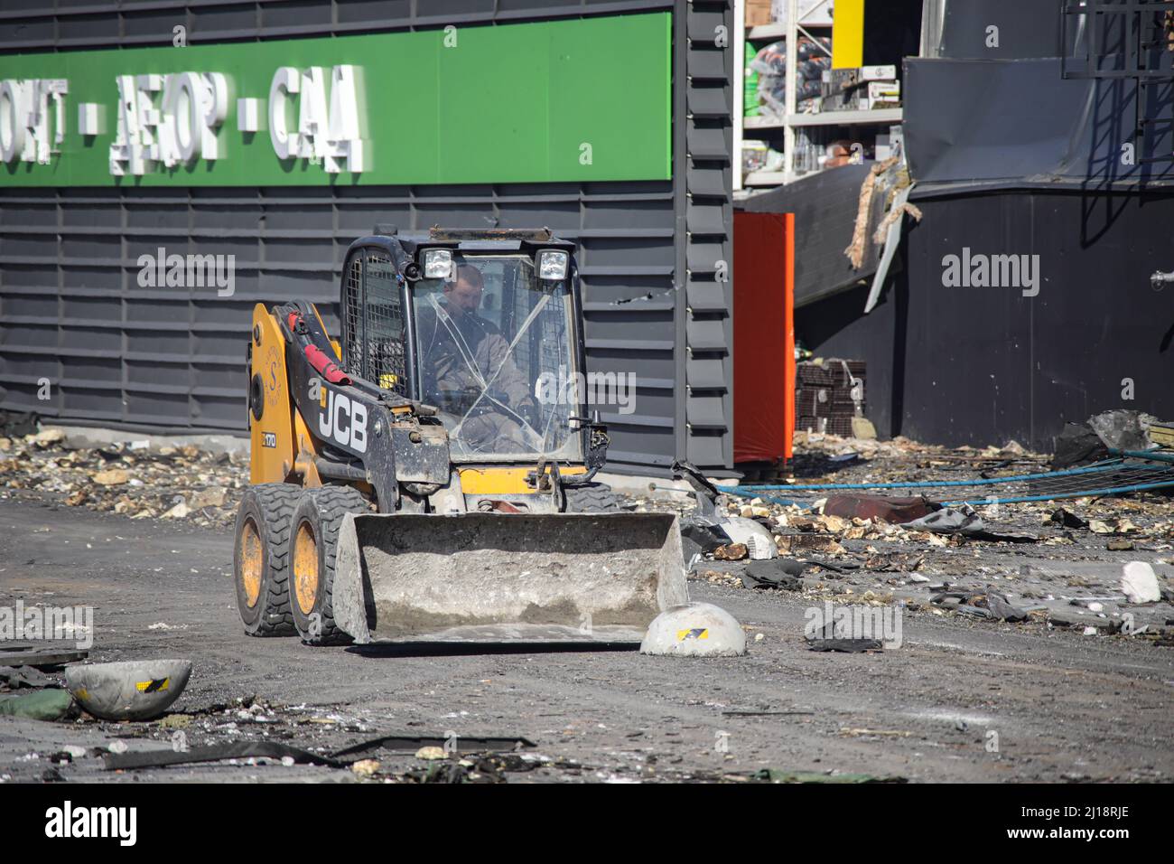 KYIV, UKRAINE - MARCH 23, 2022 - A driver operates a bucket loader to ...