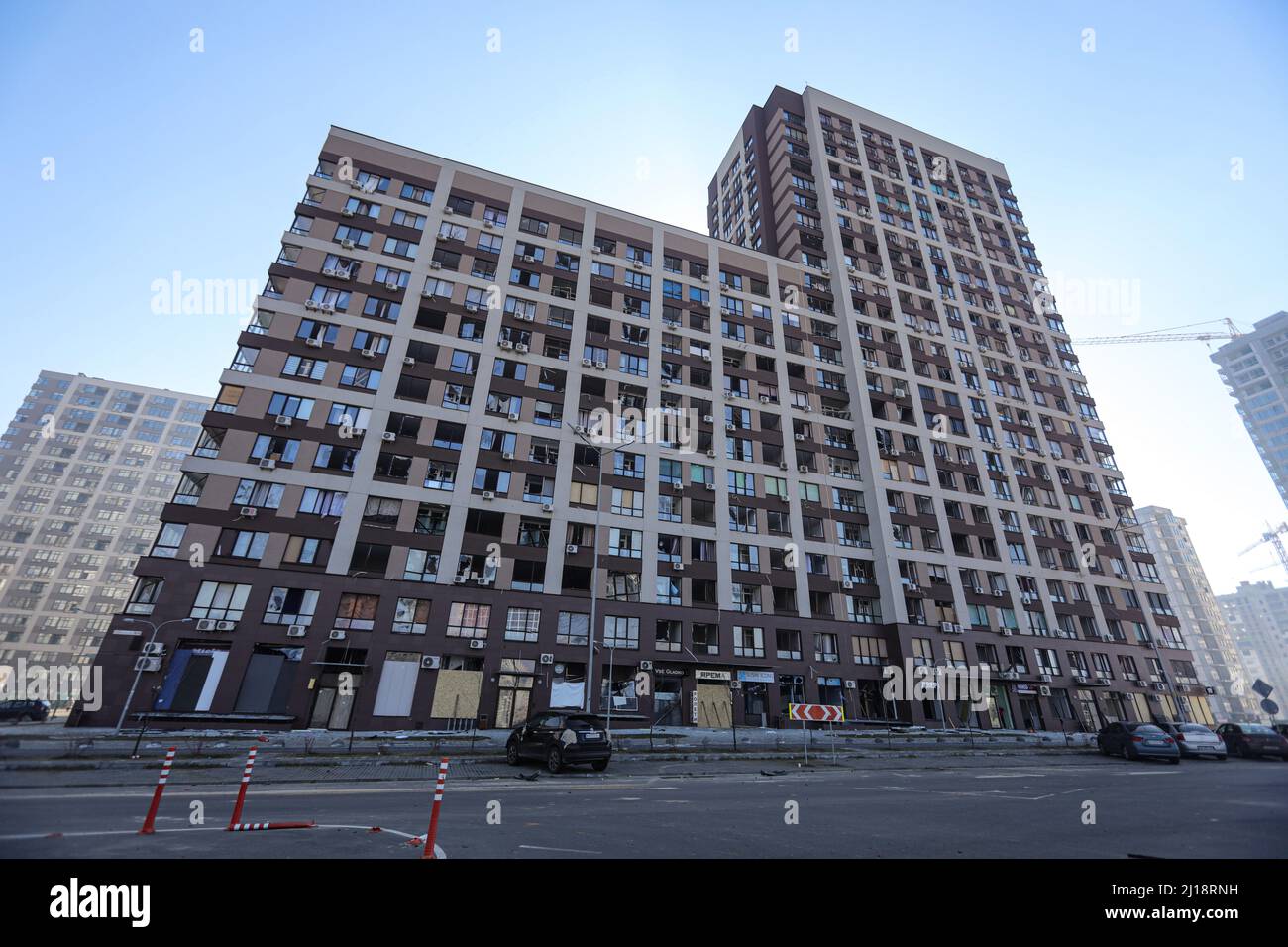 KYIV, UKRAINE - MARCH 23, 2022 - A residential building shows damage ...