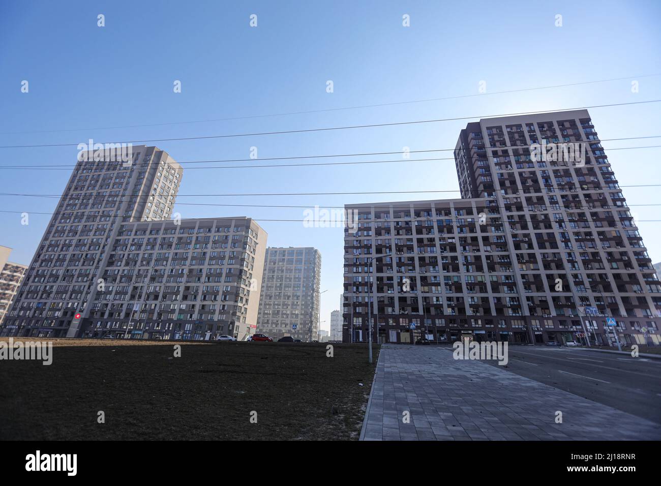 KYIV, UKRAINE - MARCH 23, 2022 - The residential buildings show damage ...