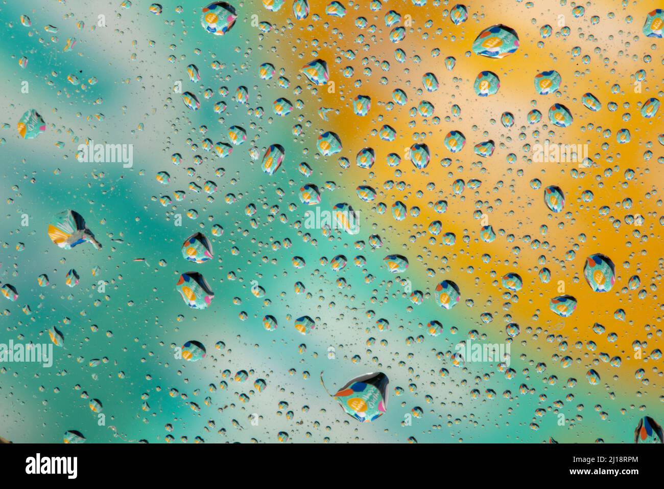 Abstract irregular water drops macro showing reflected colours Stock ...