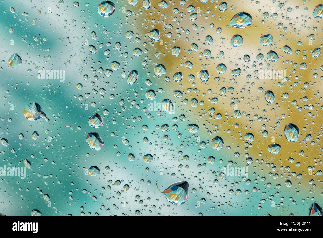 Abstract irregular water drops macro showing reflected colours Stock ...
