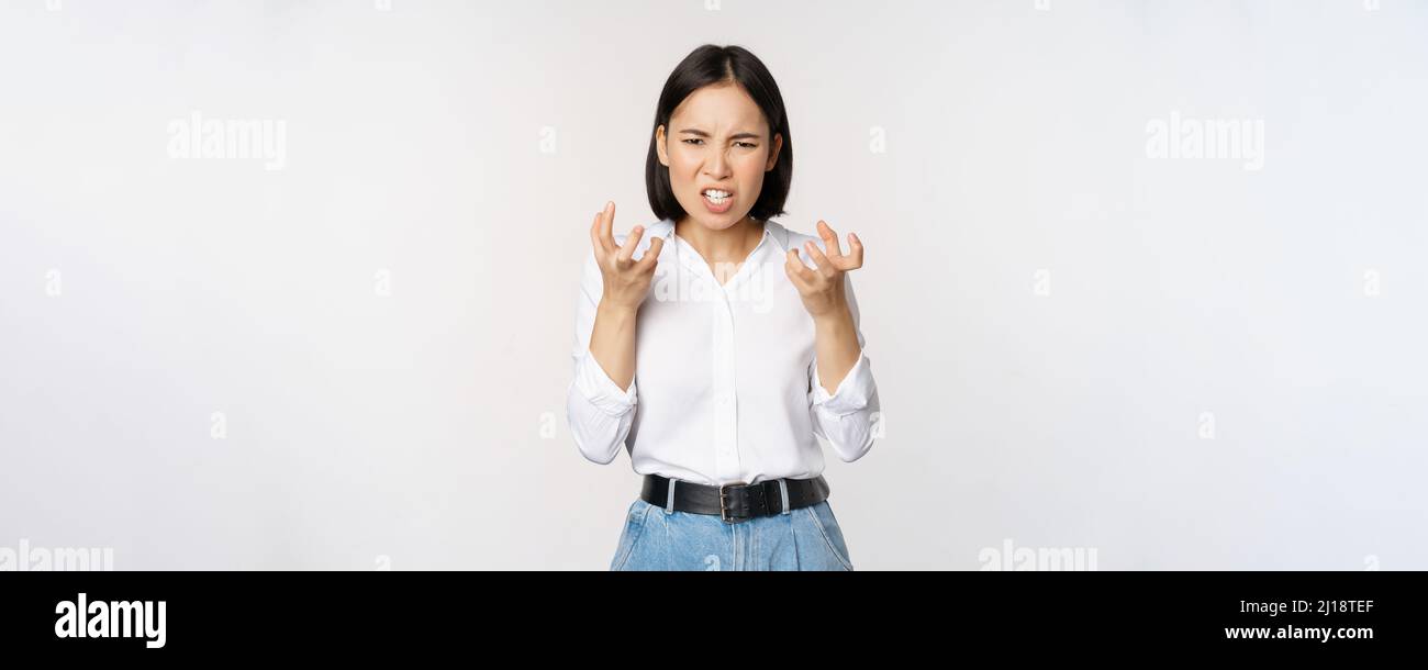 Image of angry pissed off woman shaking from anger, clench hands and ...