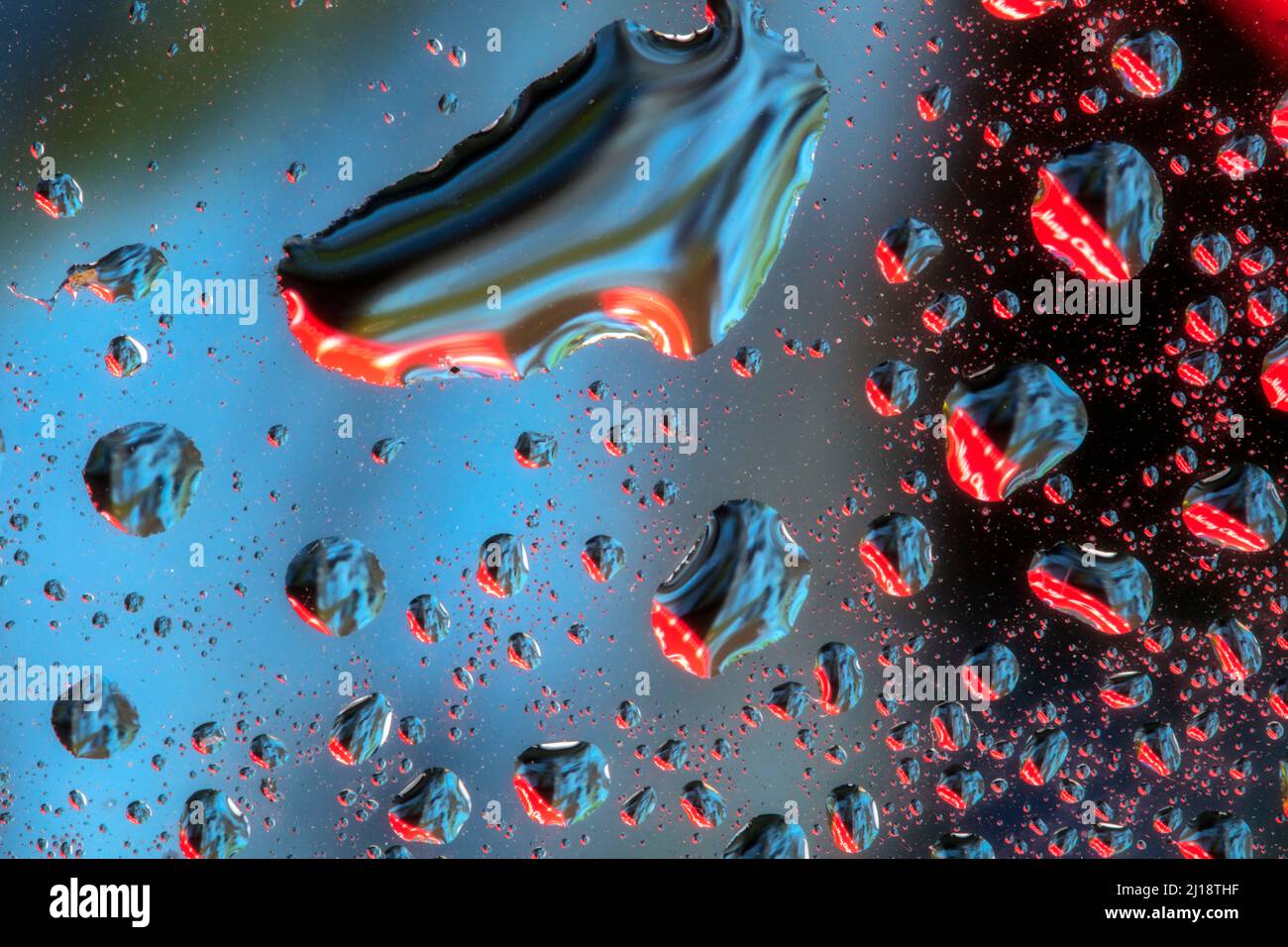 Abstract irregular water drops macro showing reflected colours Stock ...