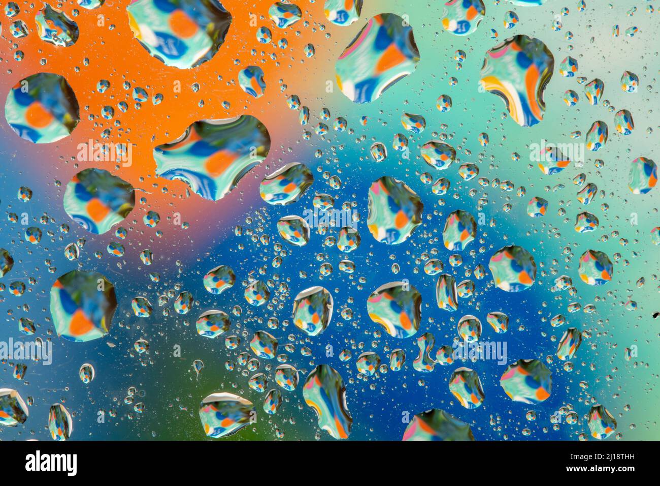 Abstract irregular water drops macro showing reflected colours Stock ...
