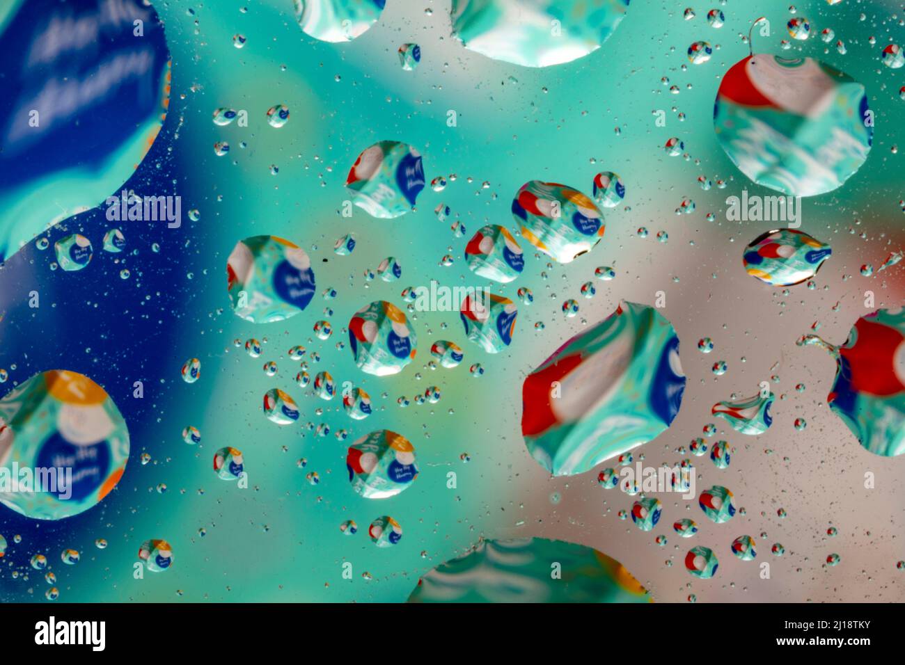 Abstract irregular water drops macro showing reflected colours Stock ...