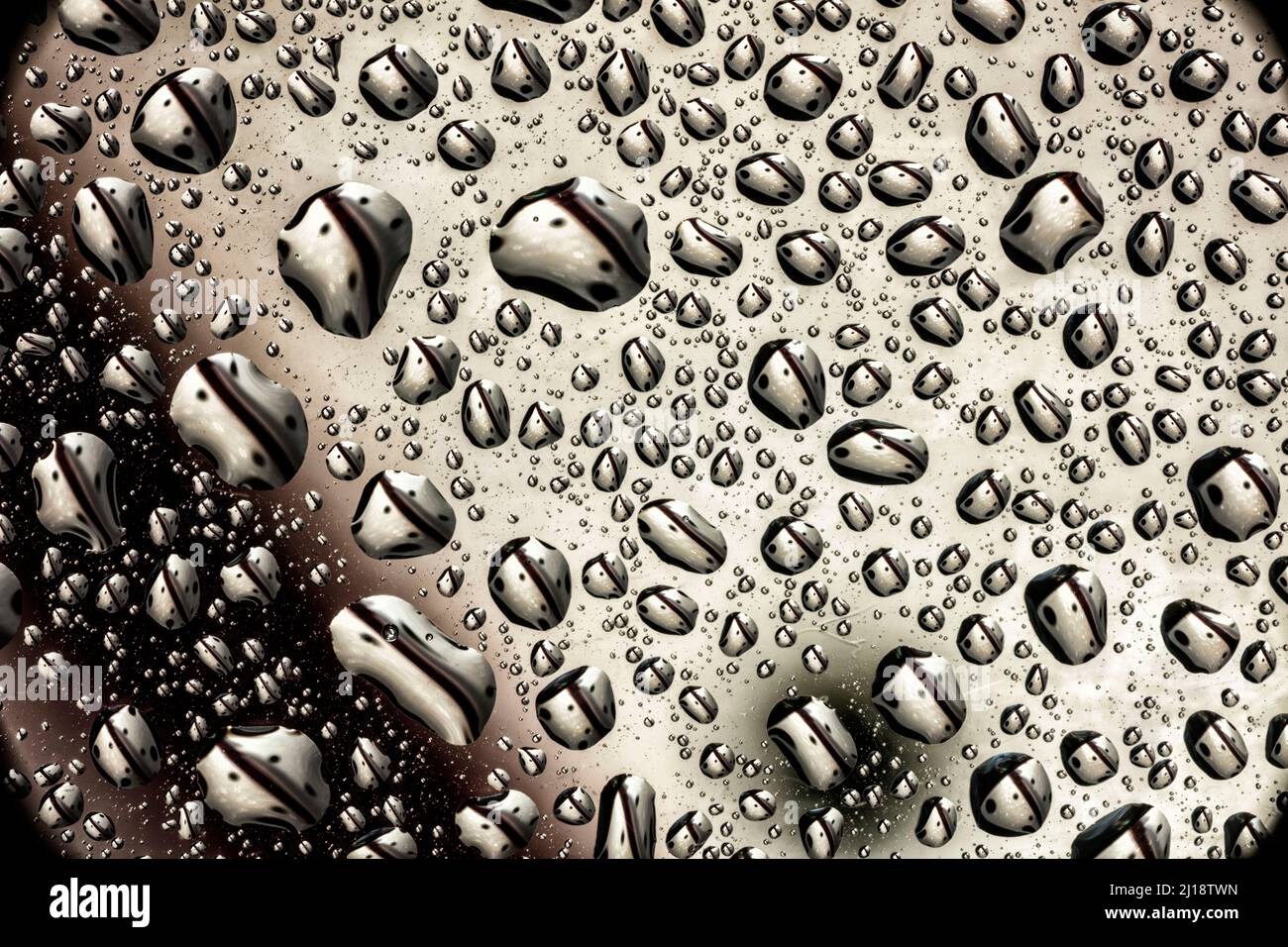 Abstract irregular water drops macro showing reflected colours Stock ...