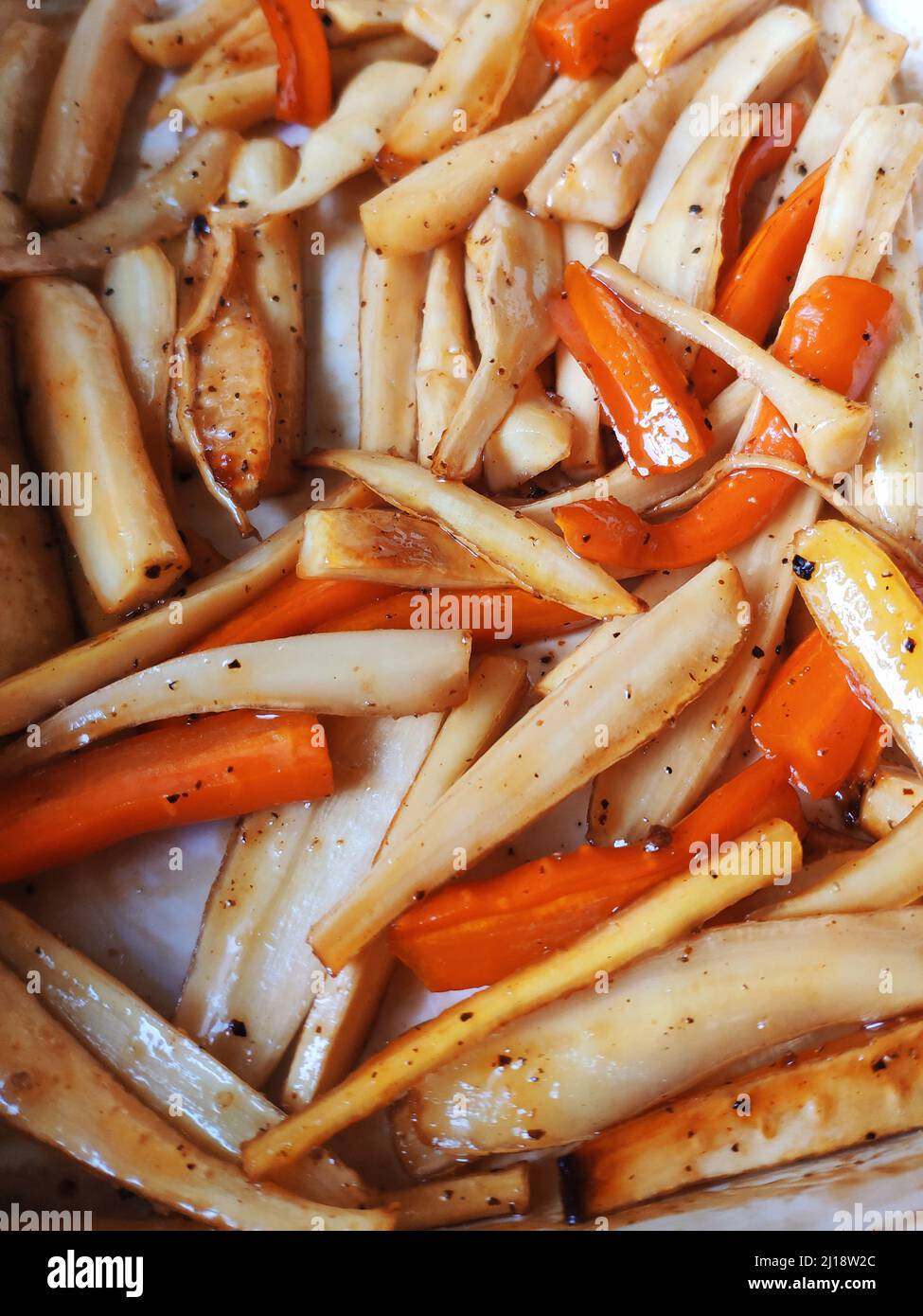 Mixed root vegetable roast with herbs. Healthy food Stock Photo - Alamy