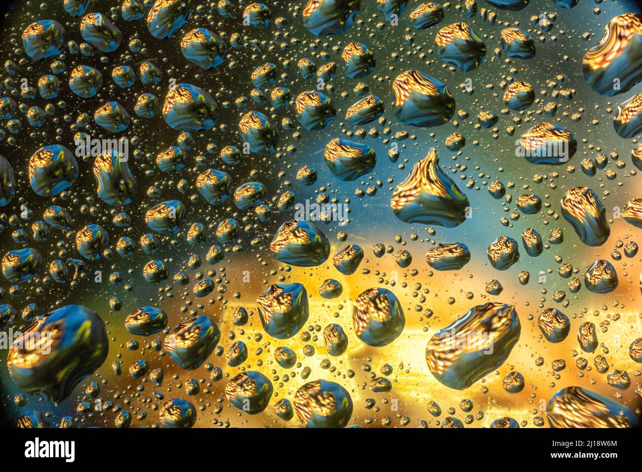 Abstract irregular water drops macro showing reflected colours Stock ...