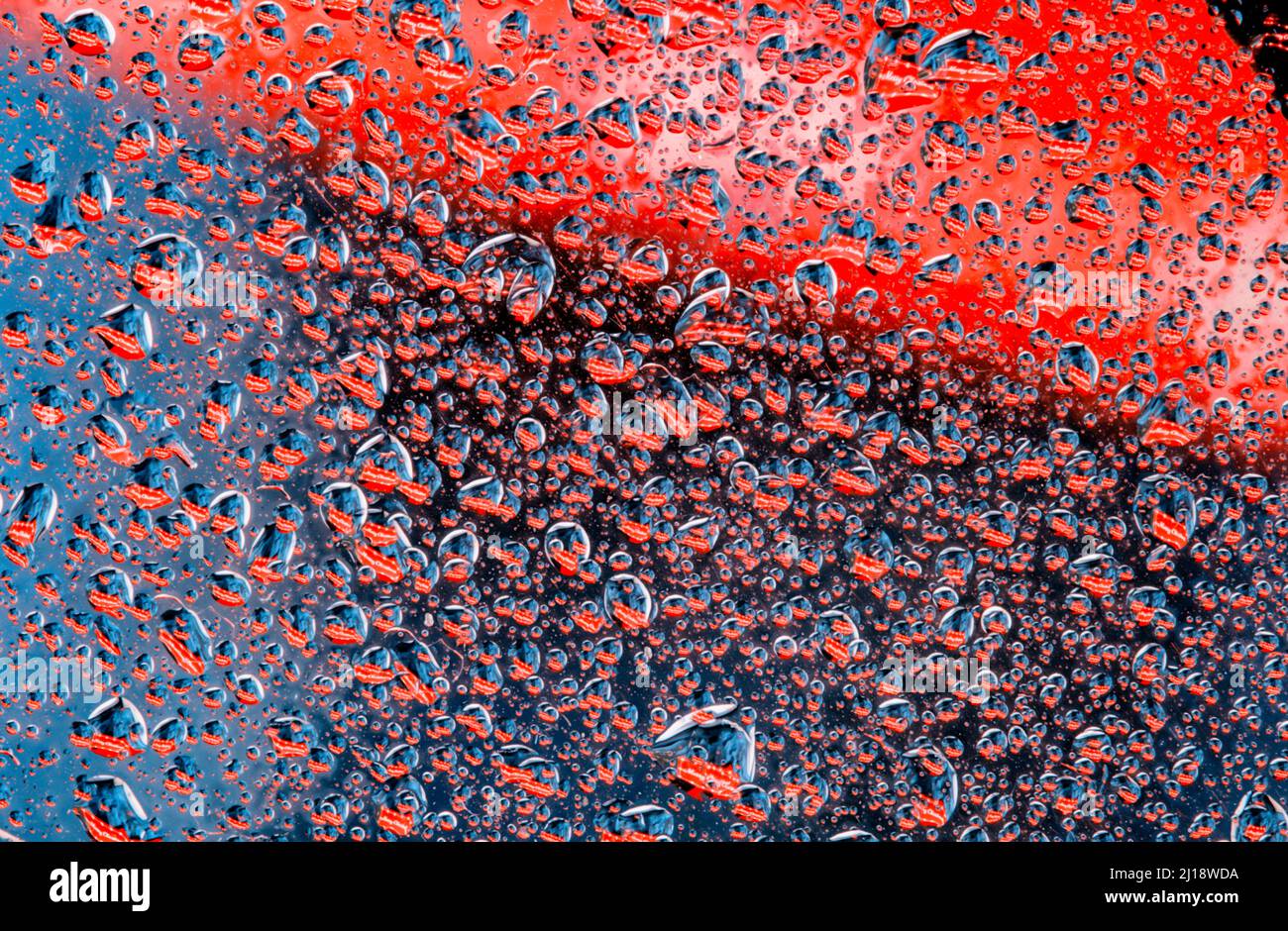 Abstract irregular water drops macro showing reflected colours Stock ...