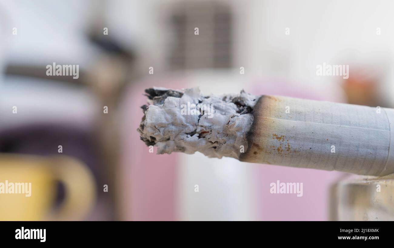 Burning cigarette hi-res stock photography and images - Alamy
