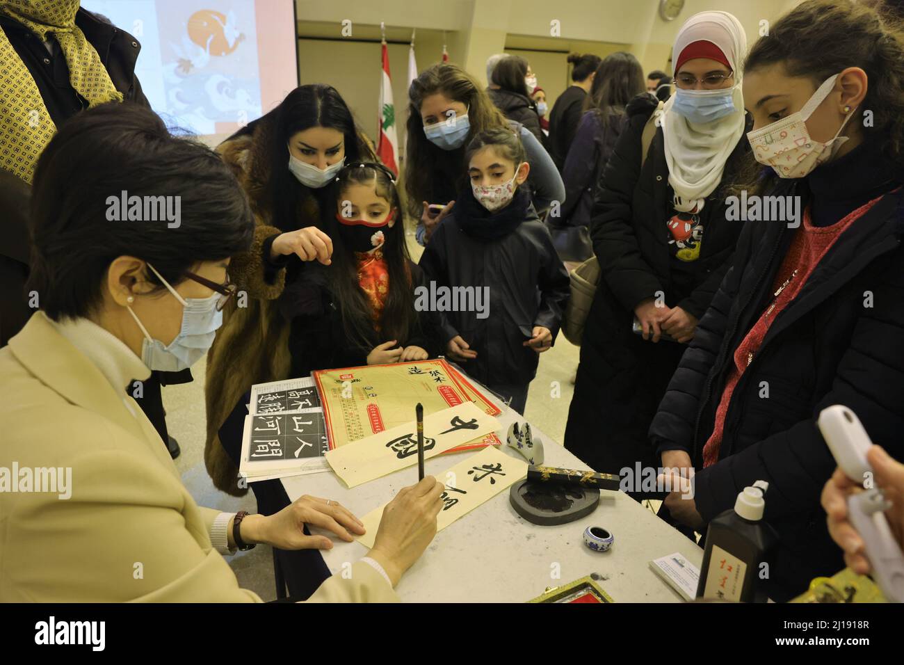 Beirut, Lebanon. 22nd Mar, 2022. A Chinese teacher displays Chinese ...