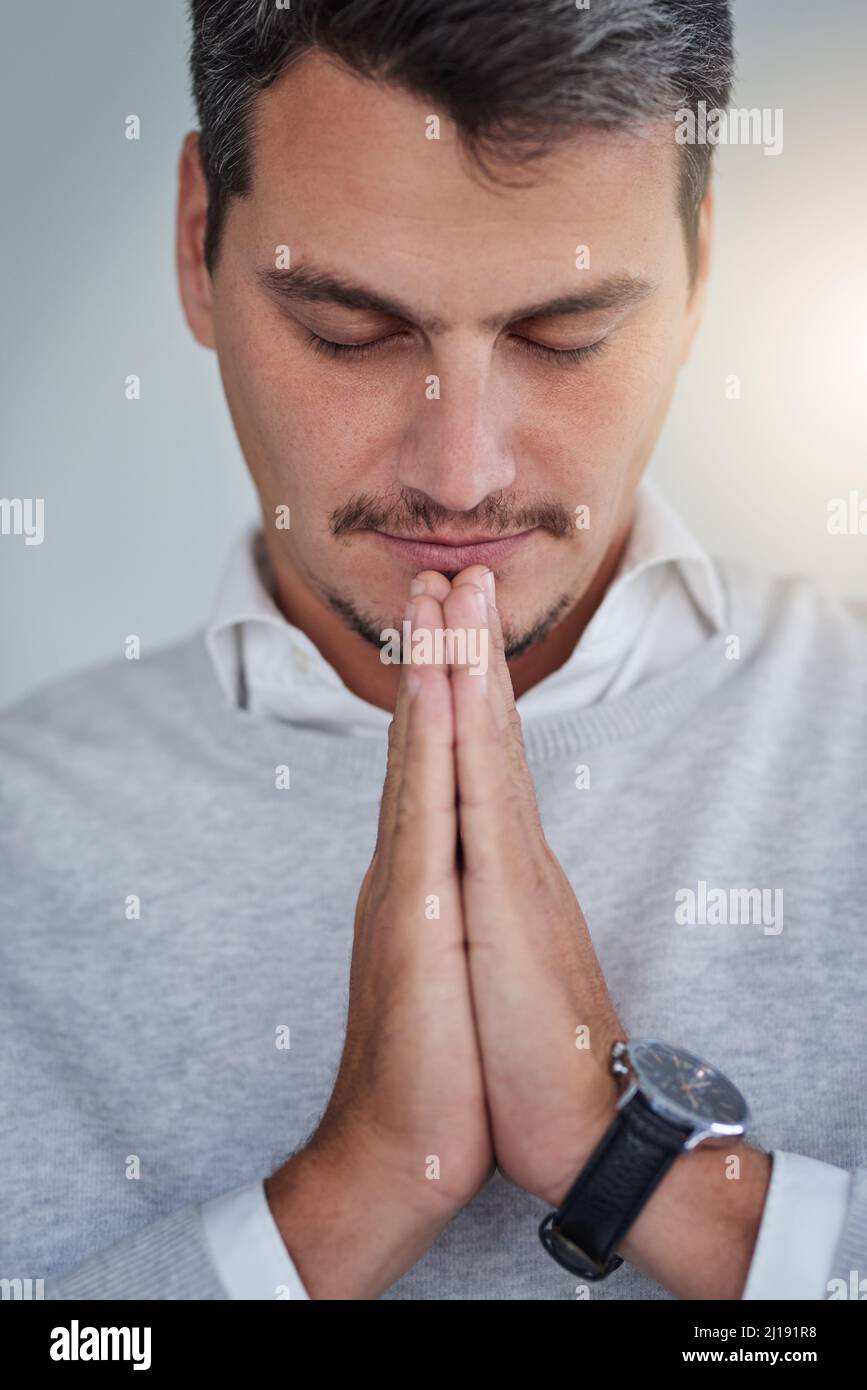 Businessman praying hi-res stock photography and images - Alamy