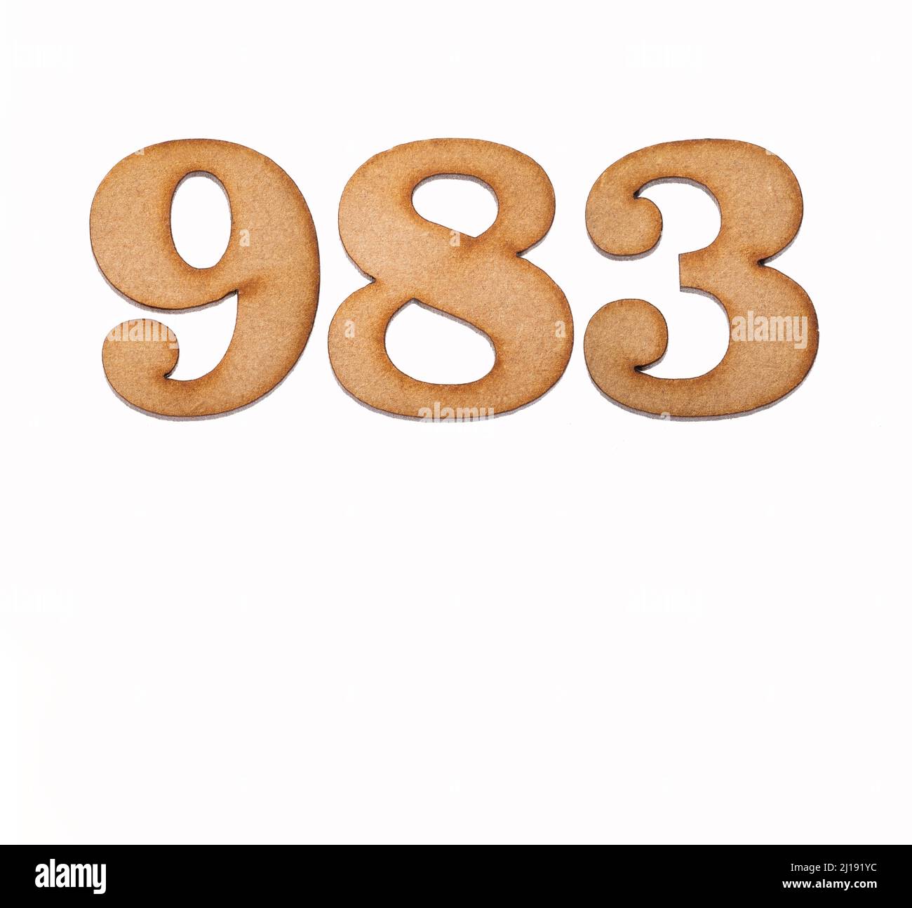 Number 983 in wood, isolated on white background Stock Photo - Alamy