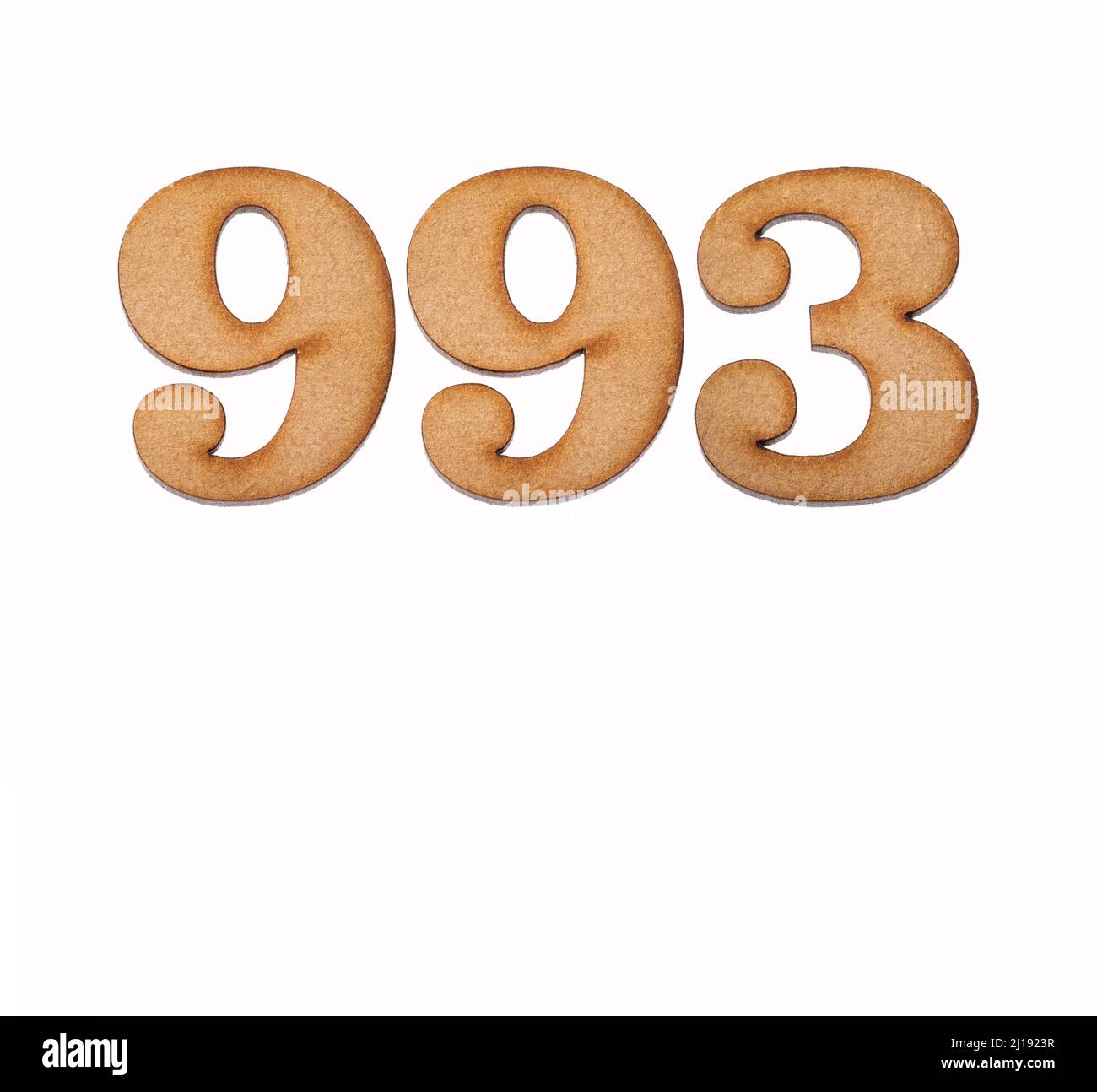 Number 993 in wood, isolated on white background Stock Photo - Alamy