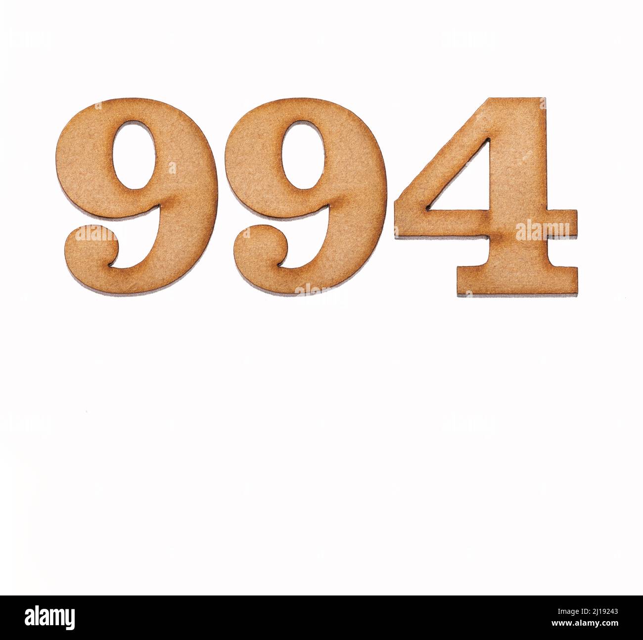 Number 994 - Piece of wood isolated on white background Stock Photo - Alamy