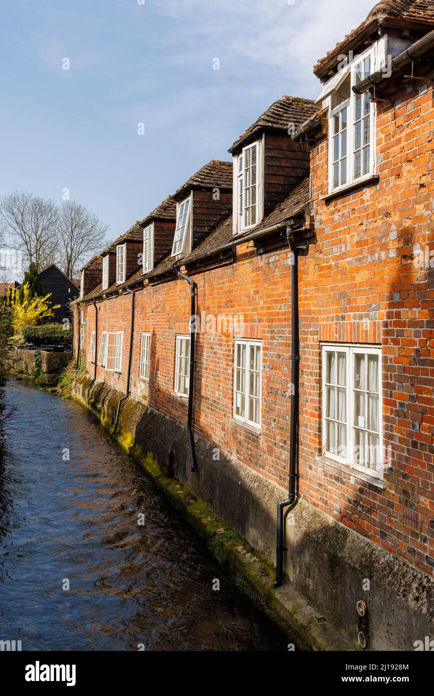Historic red brick cottages with dormer and infilled windows backing on ...