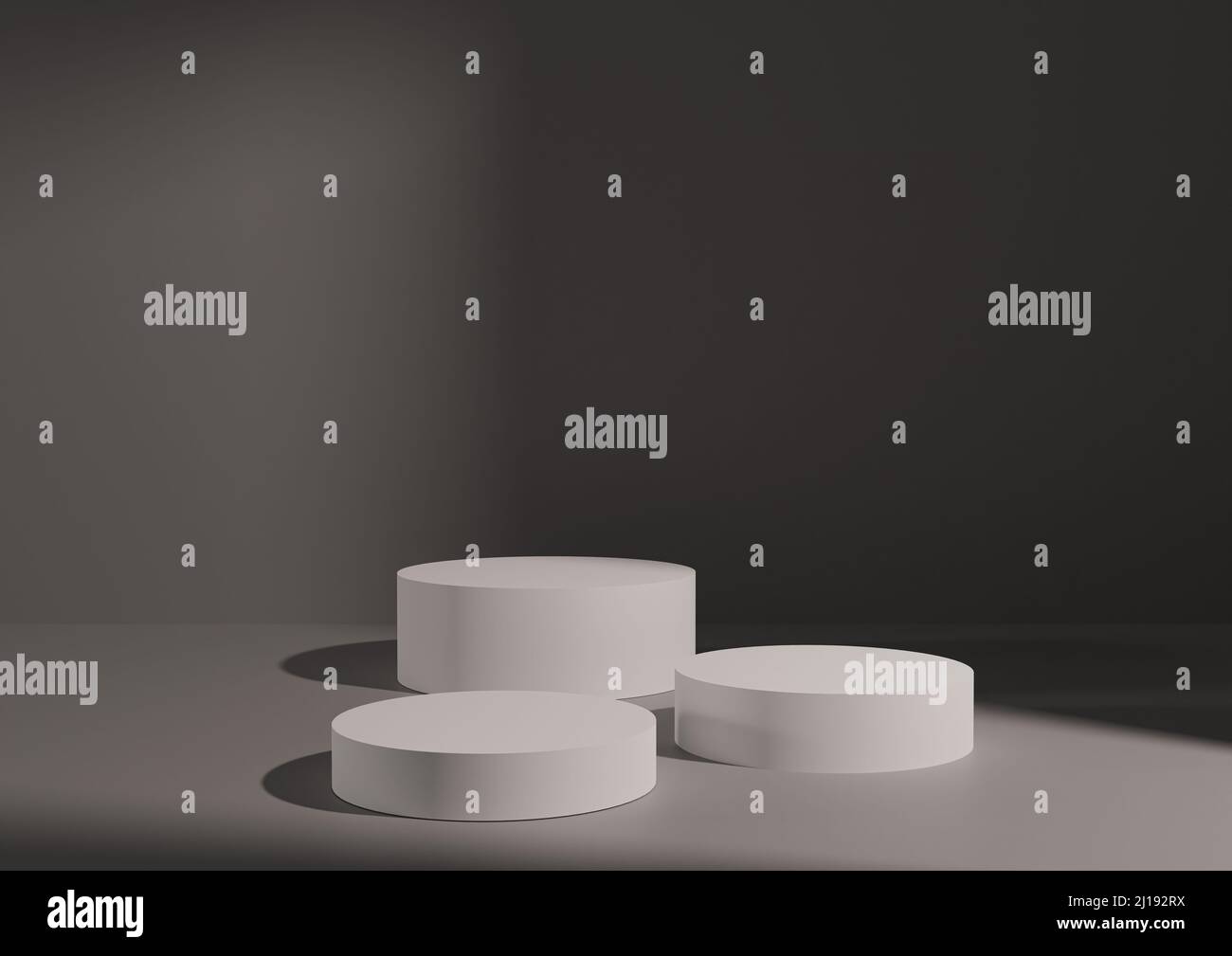Three light grey podiums or stands on dark grey background for product ...