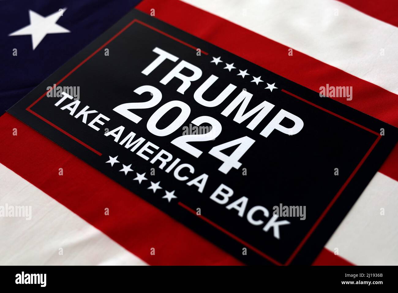 Trump Take America Back over Waving American Flag Stock Photo - Alamy