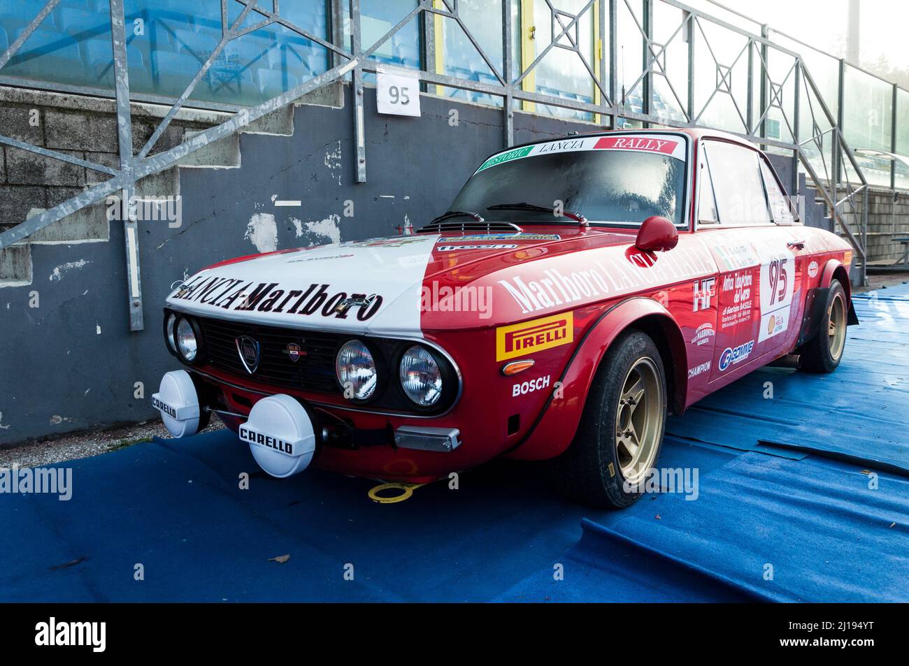 The side shot of a vintage rally car in esposizion lancia Stock Photo ...