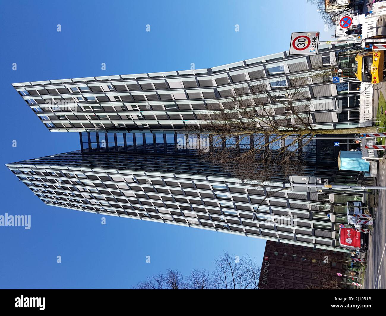 A vertical shot of the STRABAG Real Estate building in Hamburg, Germany ...