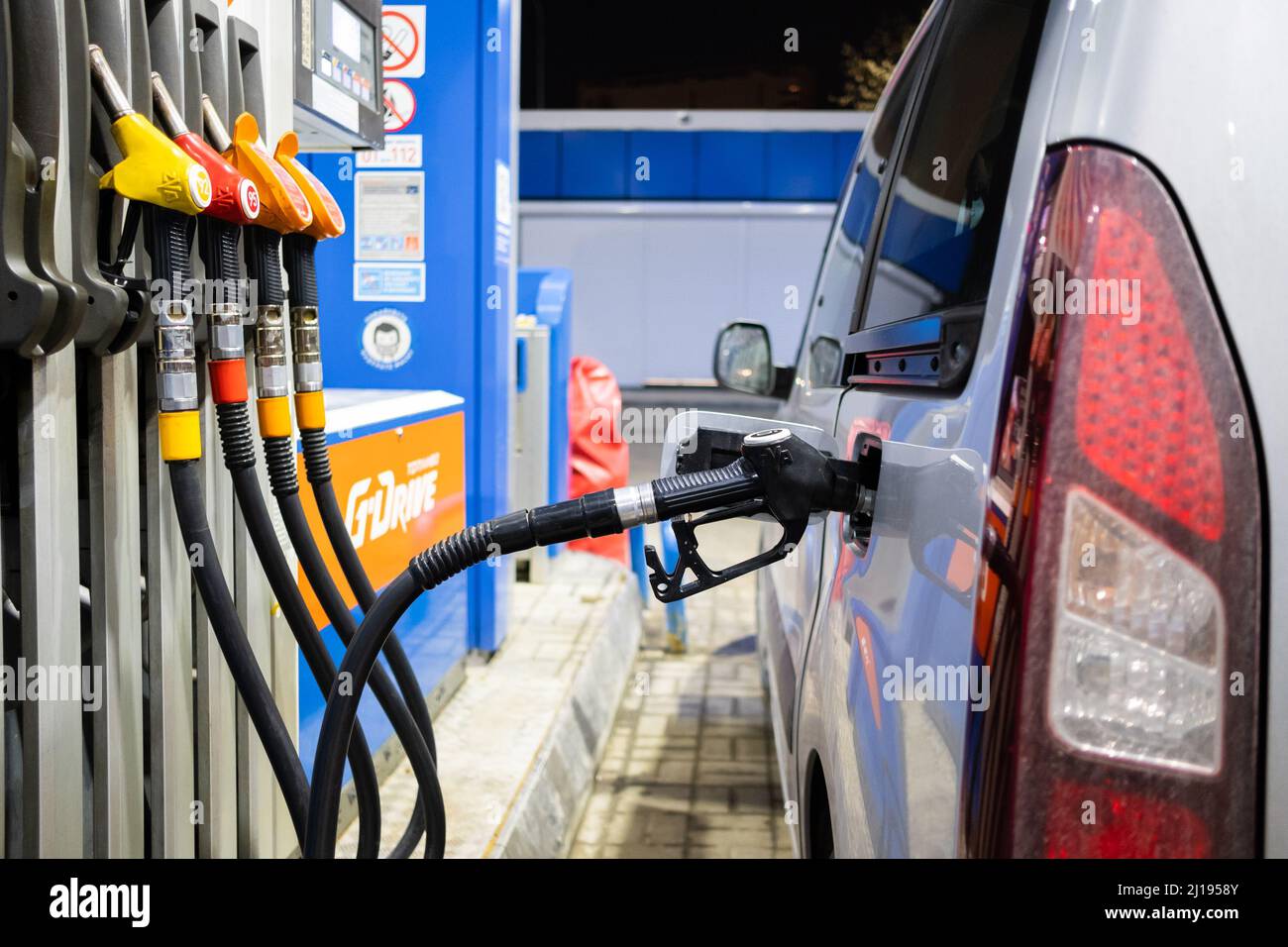 Moscow. Russia. February 26, 2022. Refueling the fuel tank of a car at ...