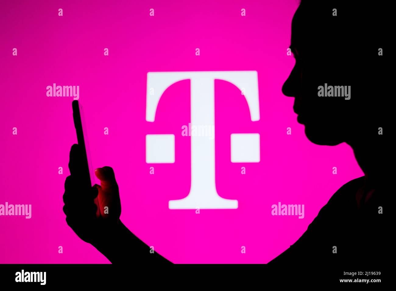 In this photo illustration, a woman's silhouette is holding a ...