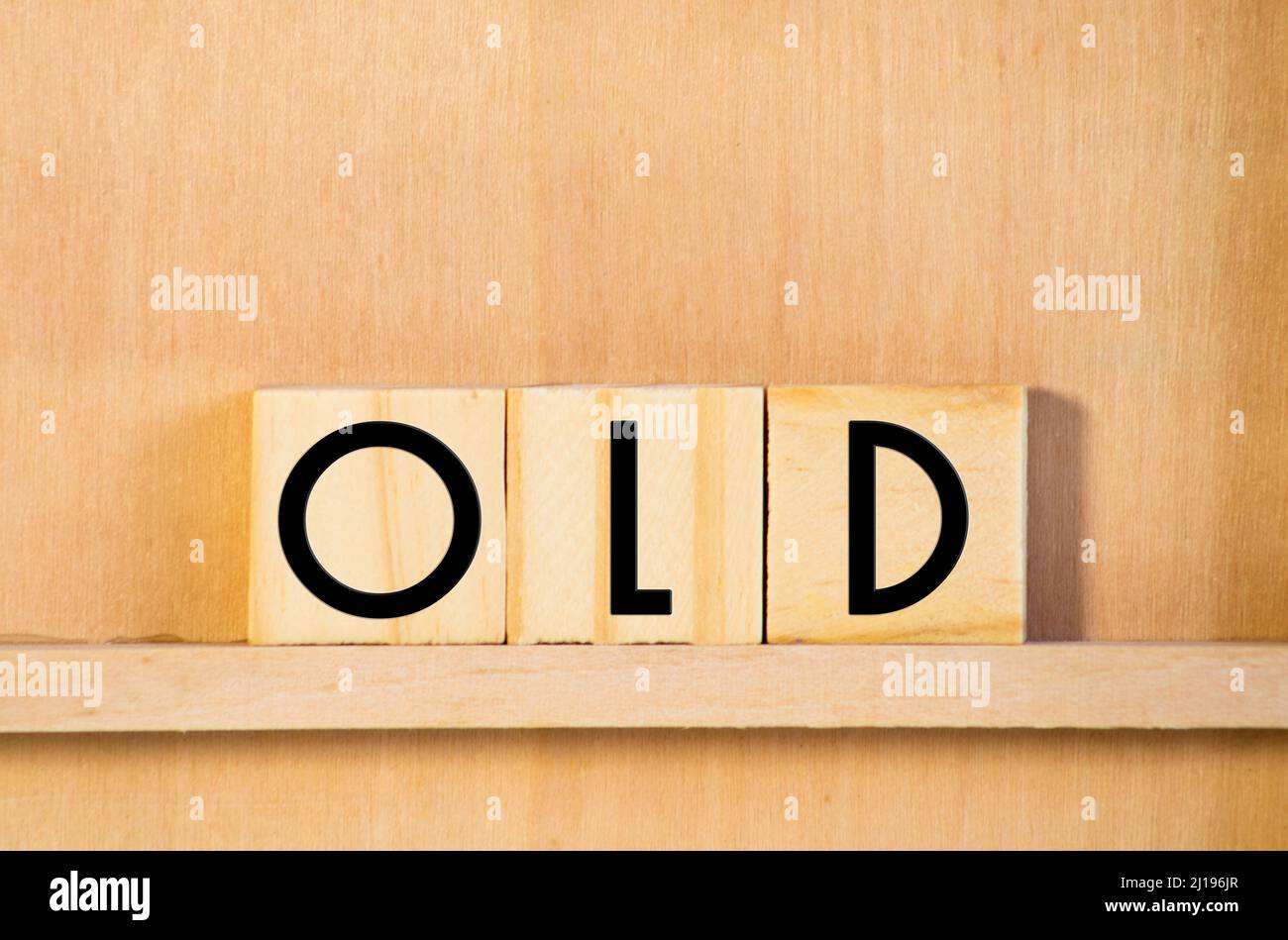 Old Paper texture and word OLD on wooden block Stock Photo - Alamy
