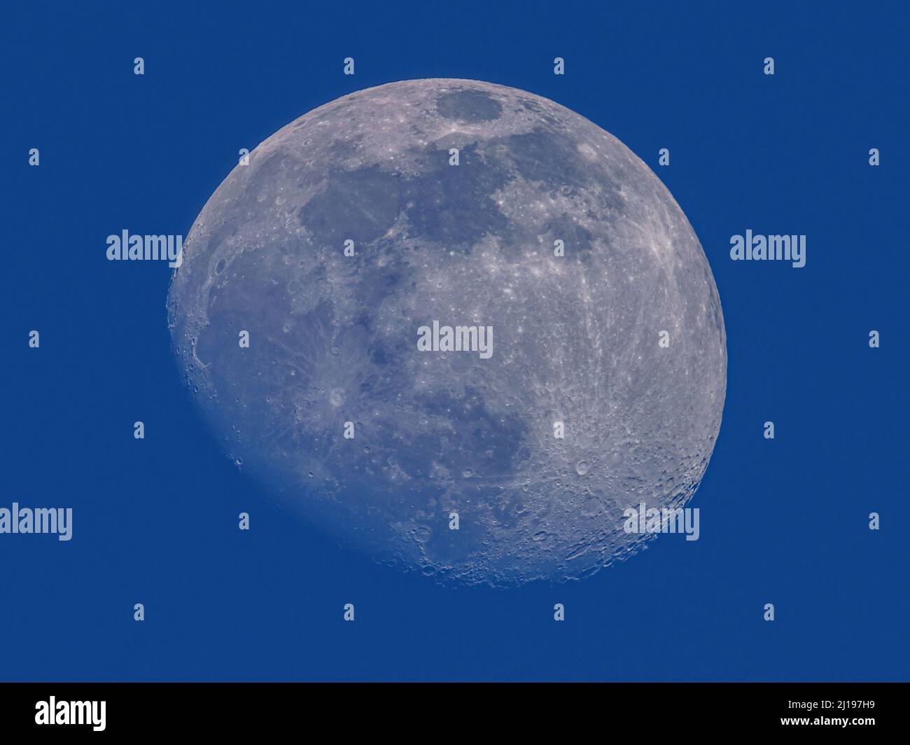 The moon with 86 percent visibility photographed from a telescope on a ...