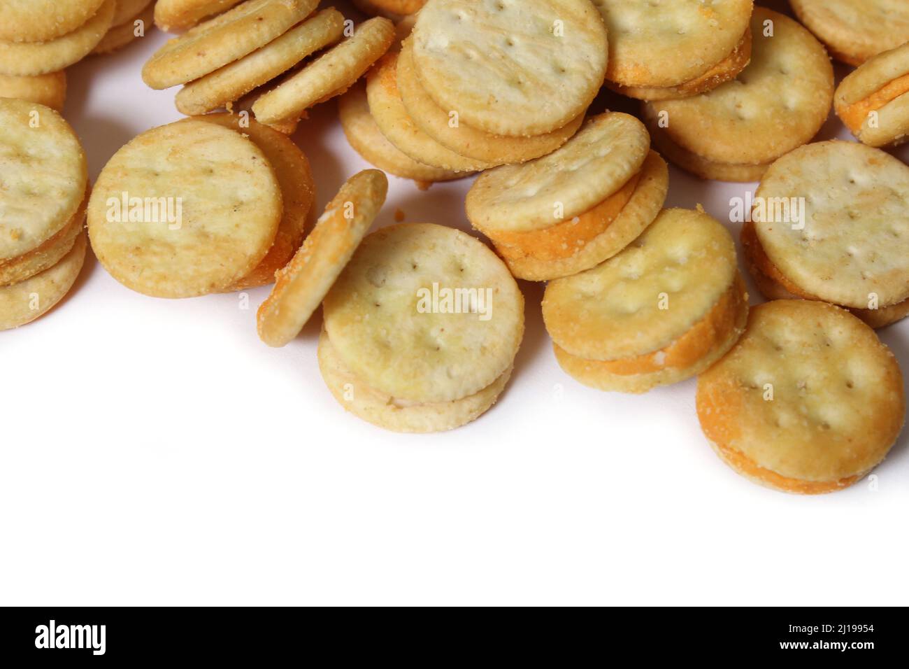 Pile of Mini Cheese Snack Crackers Close up Stock Photo - Alamy