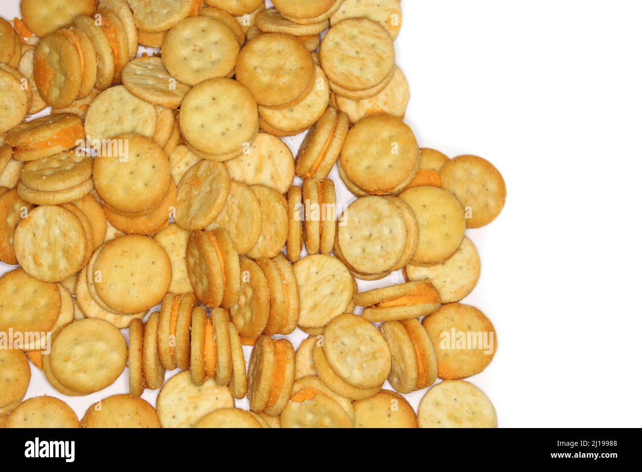 Pile of Mini Cheese Snack Crackers Close up Stock Photo - Alamy