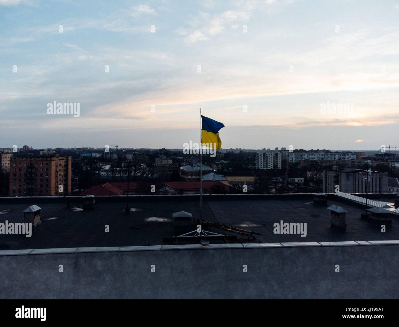 Aerial photo of Ukrainian flag on administration building in Poltava ...
