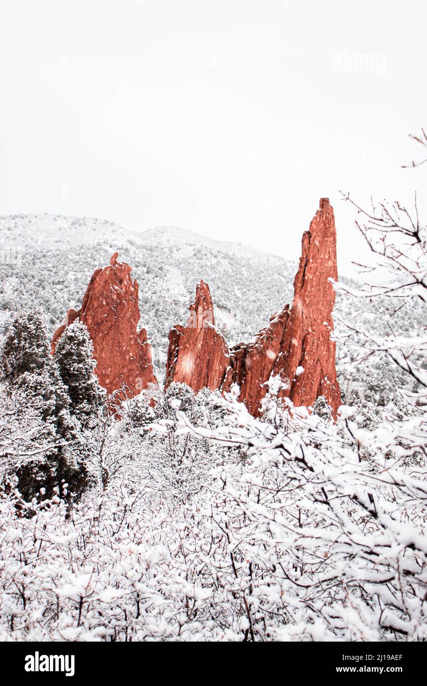 The distinct red rocks amidst a winter landscape at the Garden of the ...
