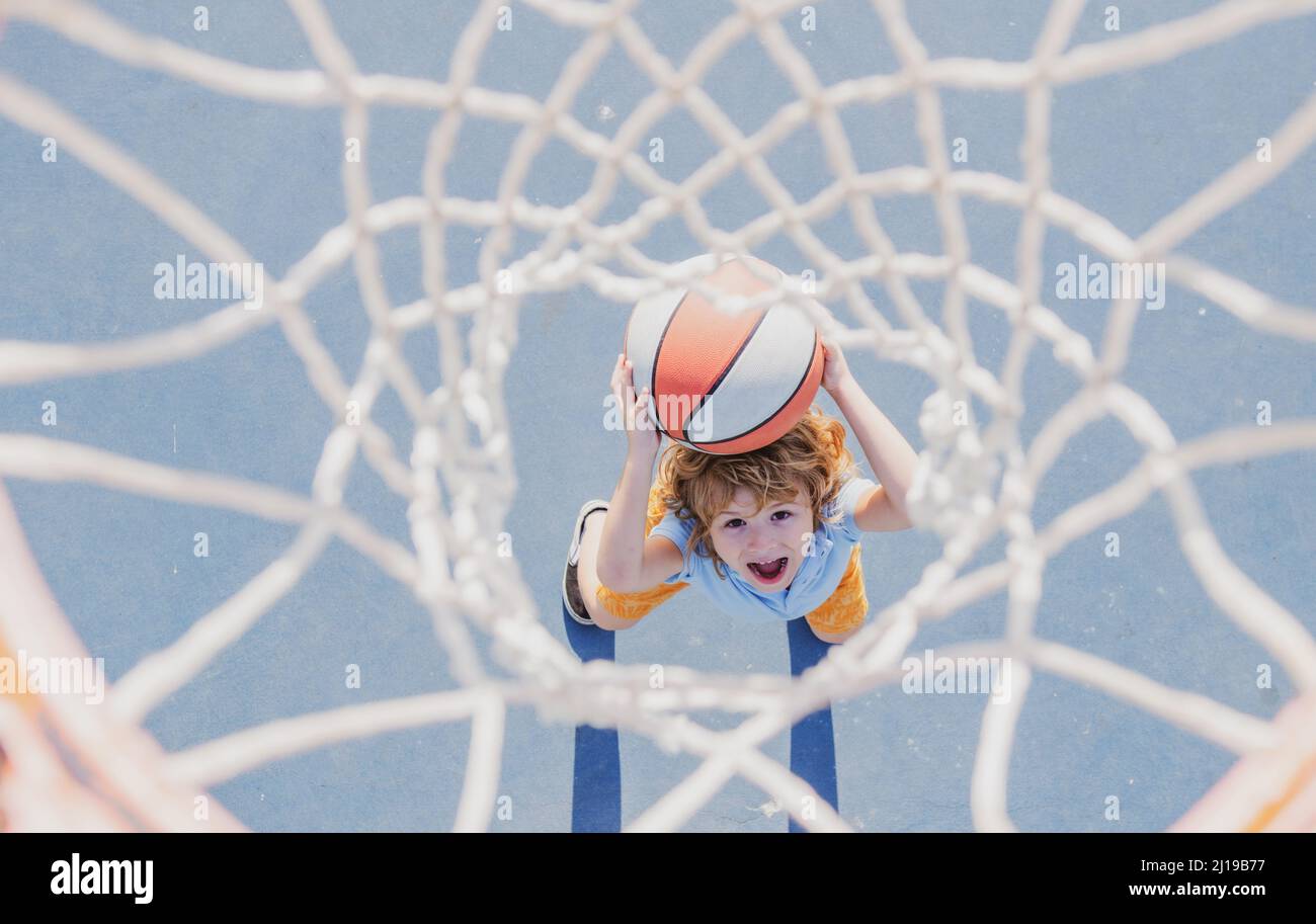 Training child ball basket hi-res stock photography and images - Alamy