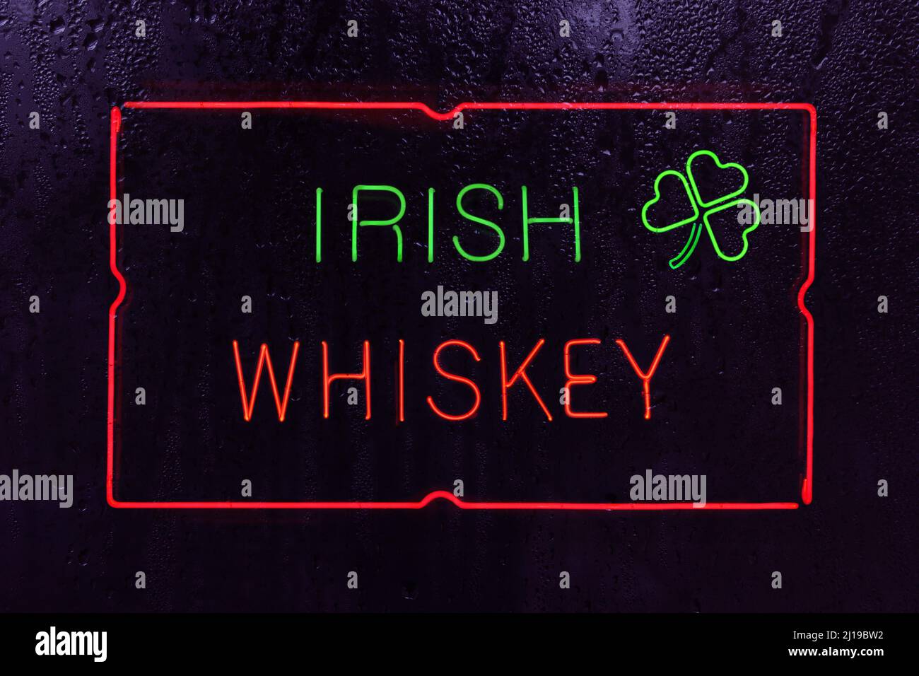 Vintage Neon Irish Whiskey Sign in Rainy Window Stock Photo - Alamy