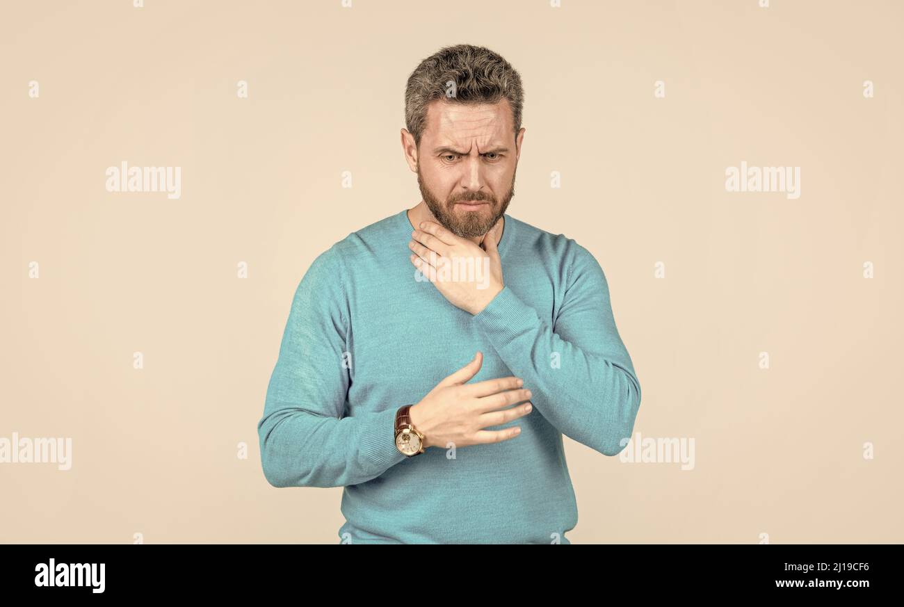 suffering man in has grizzled hair. sick man on grey background. mens ...