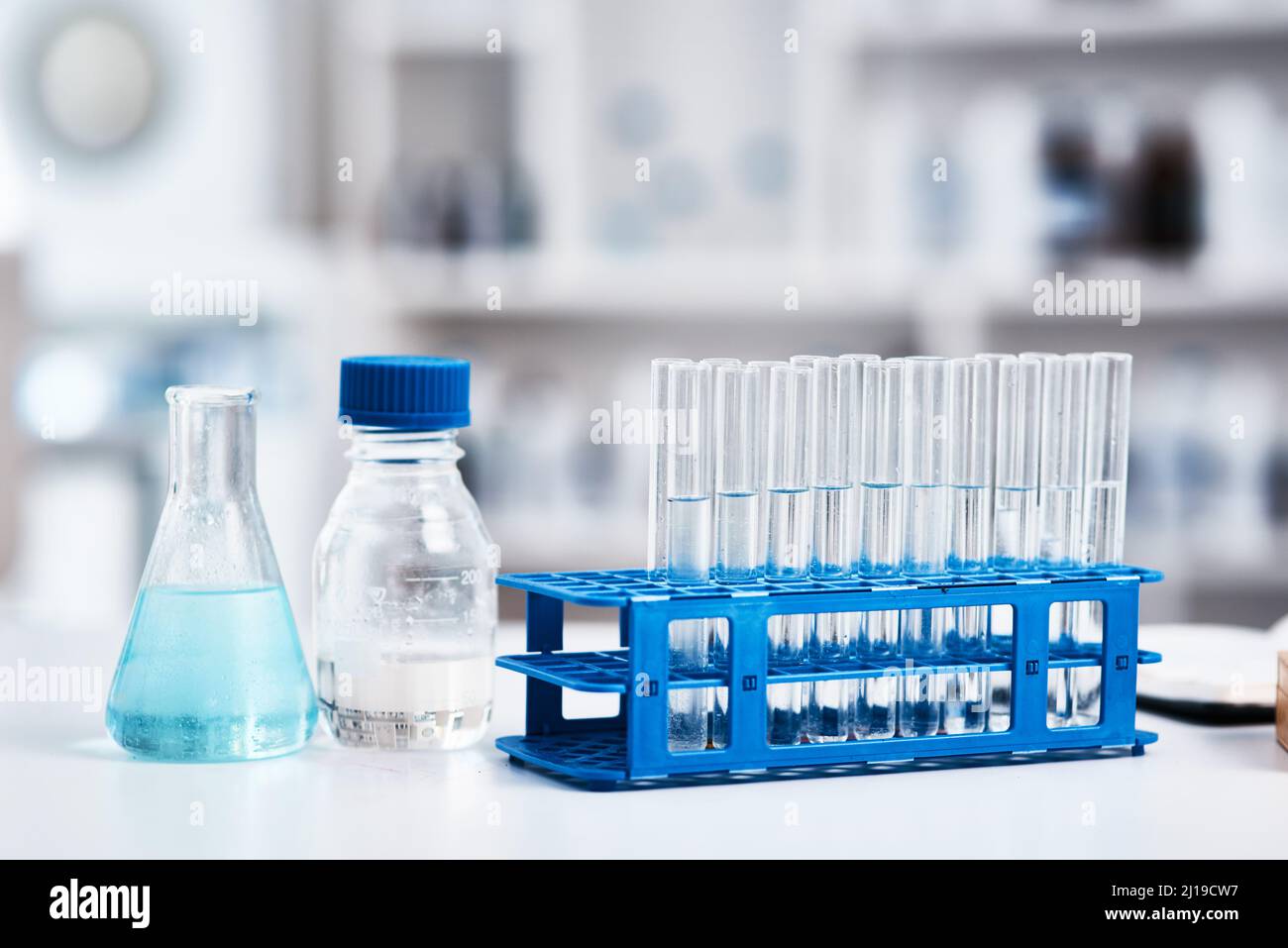 We have many samples to work with. Closeup shot of a tray of test tubes ...