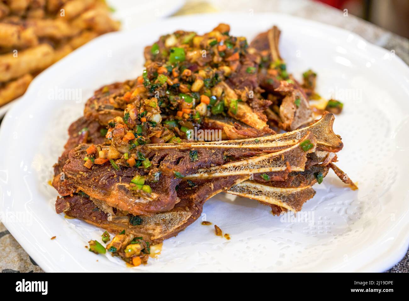 A delicious fried pork fan bone with salt and pepper Stock Photo - Alamy