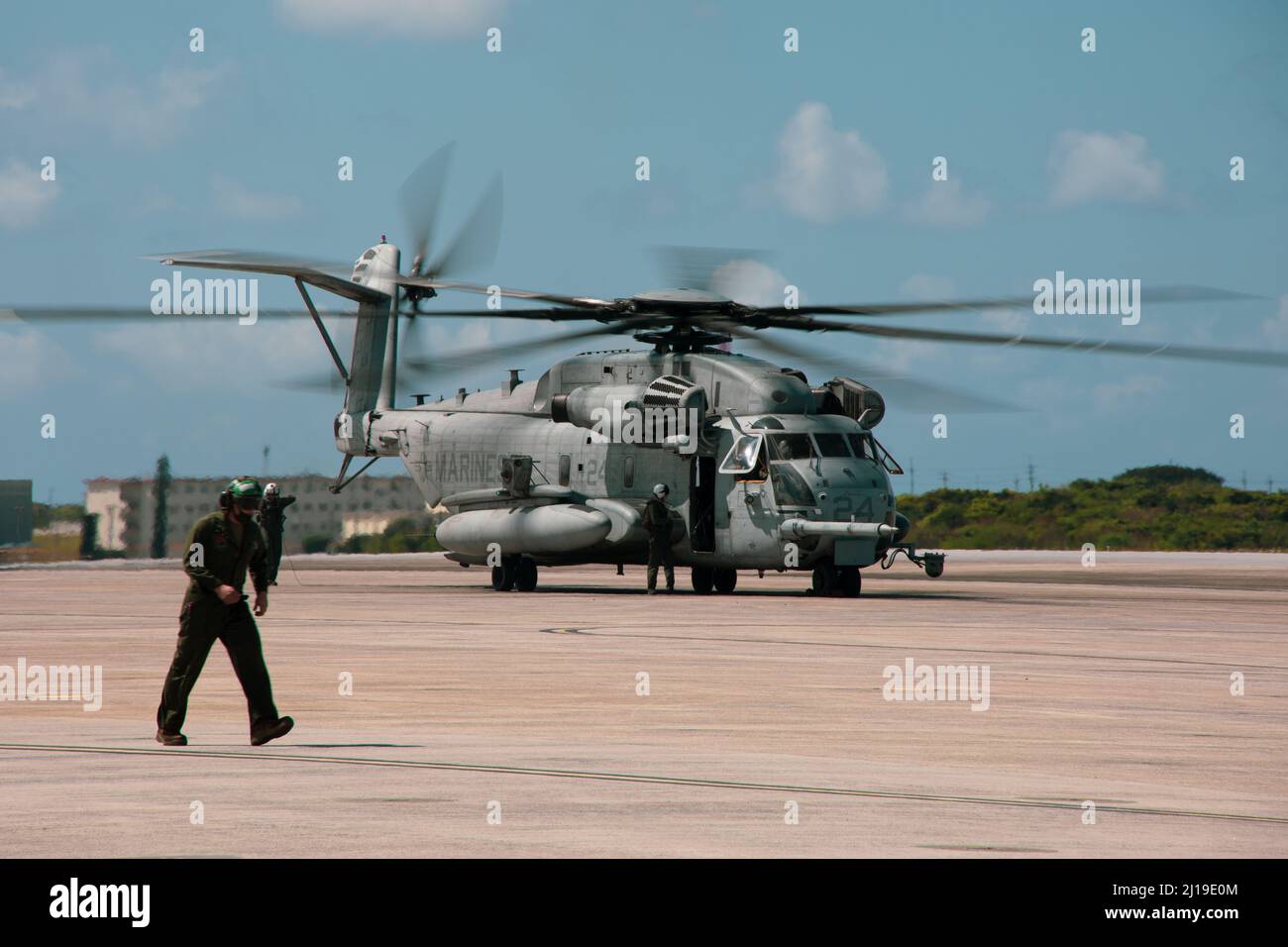 U.S. Marines with Marine Heavy Helicopter Squadron (HMH) 466 complete their final checks on a CH ...