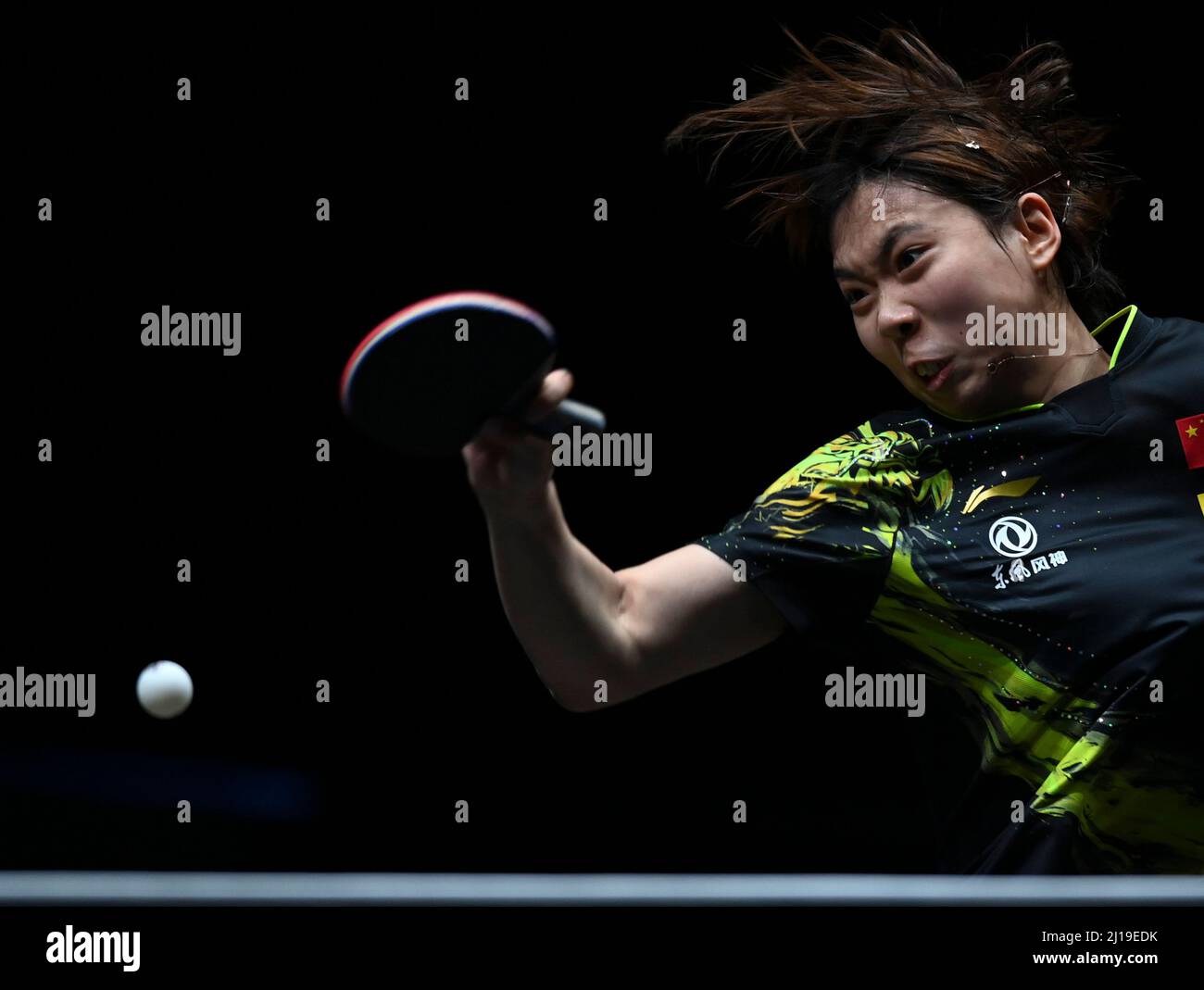 Doha, Qatar. 23rd Mar, 2022. Qi Fei of China competes during the women ...
