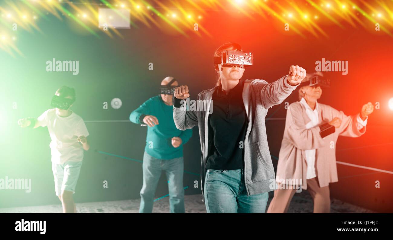 Family playing VR games together Stock Photo - Alamy