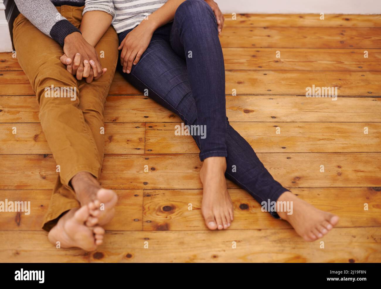Man hands on legs hi-res stock photography and images - Alamy