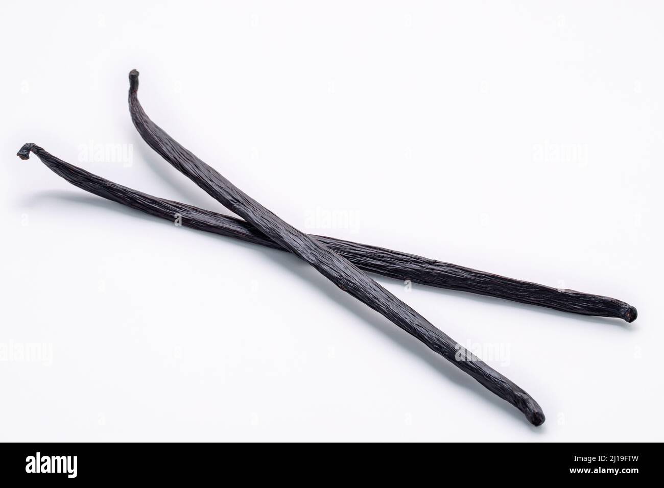 Dried Vanilla sticks isolated on white backgrounds Stock Photo - Alamy
