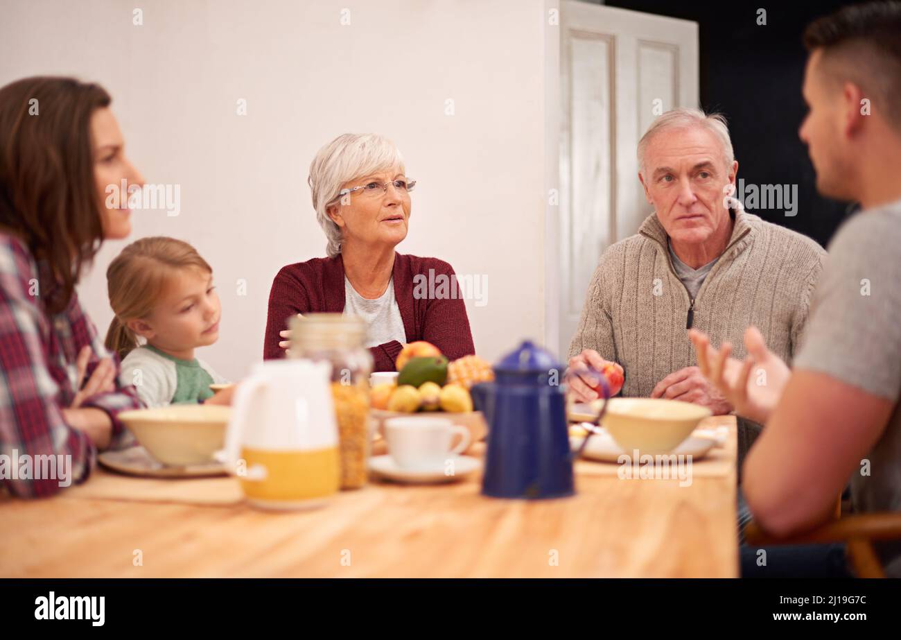 Breakfast bonding. Shot of a multi-generational family enjoying ...