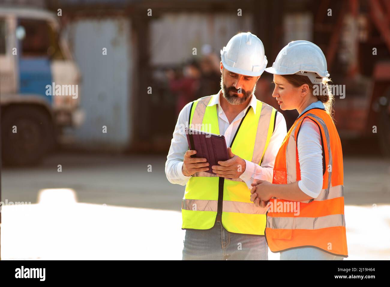 The Problem with businessman talking and checking loading Containers ...