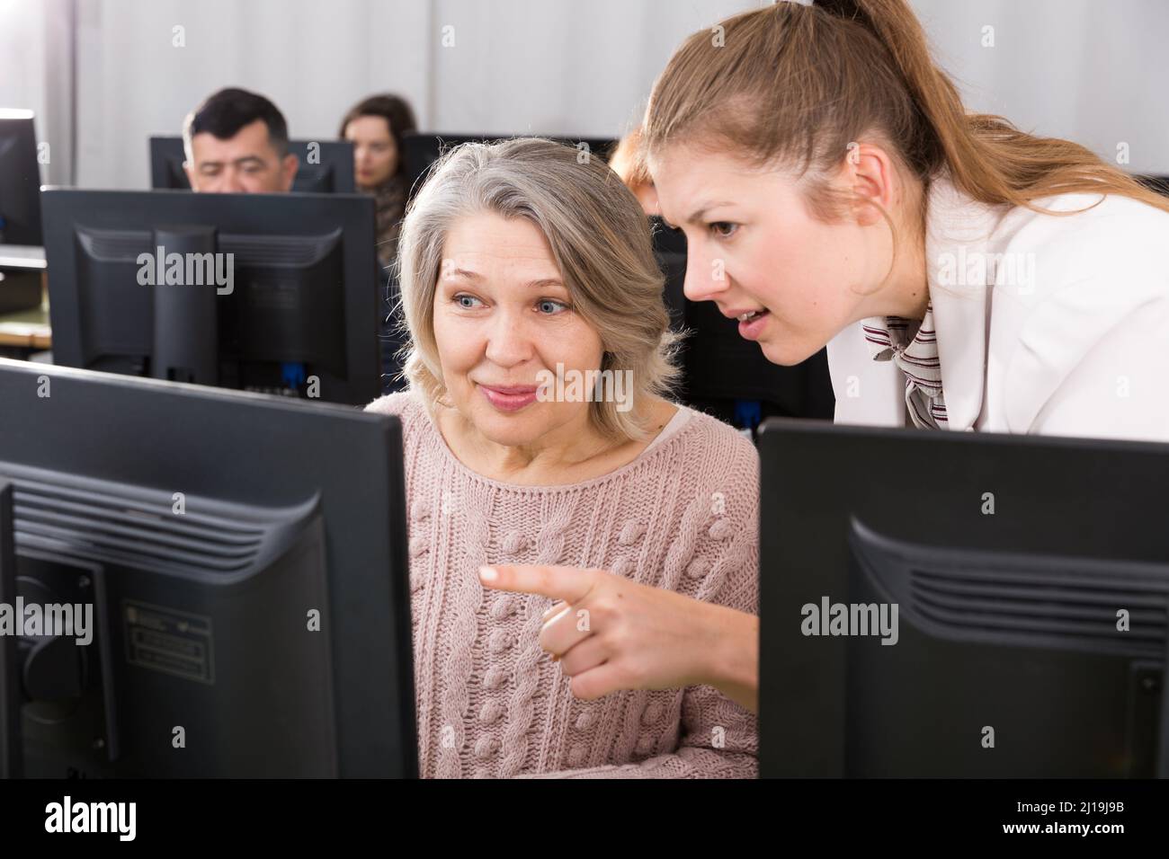 Older coworker hi-res stock photography and images - Alamy