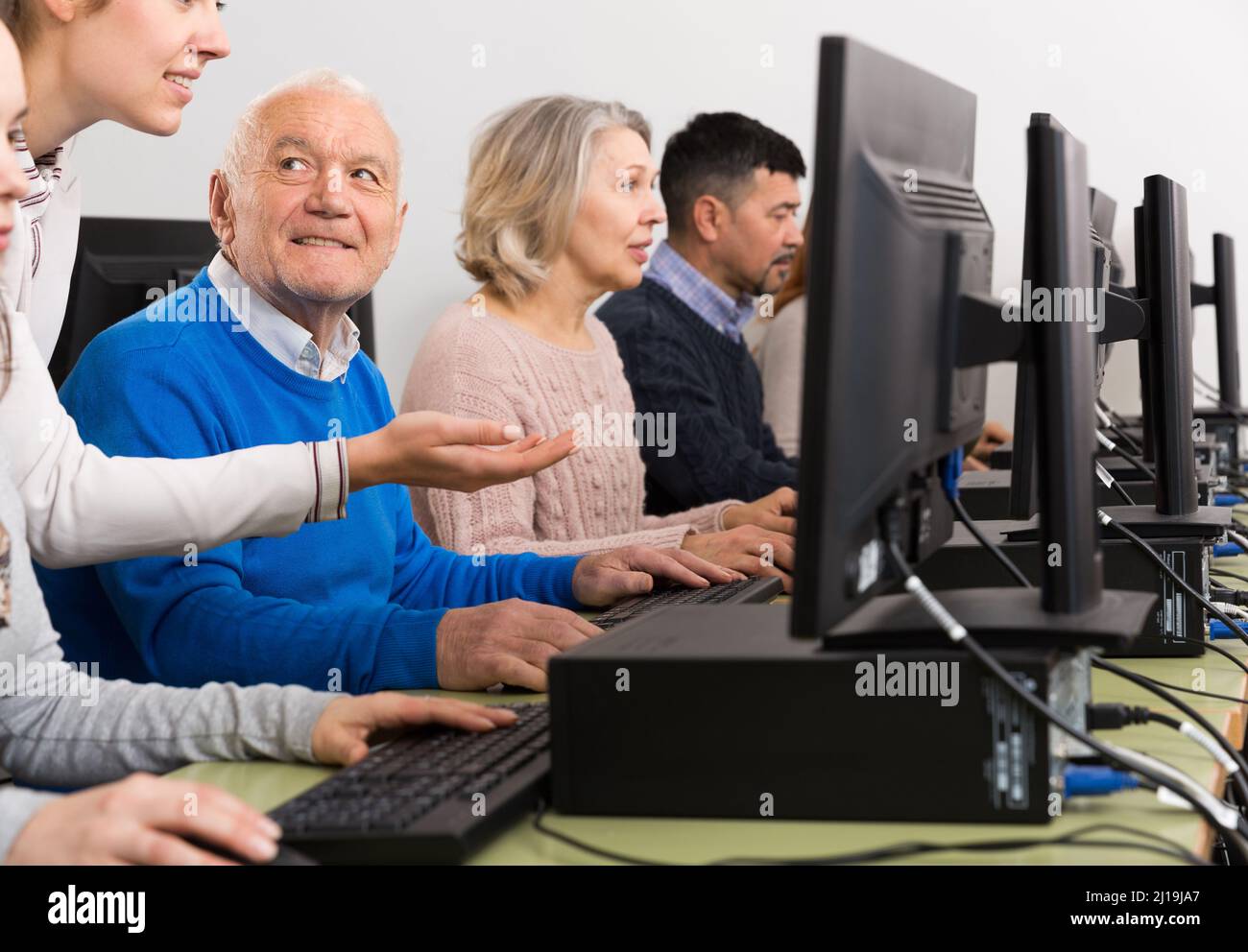 Pointing computer monitor business partners hi-res stock photography ...