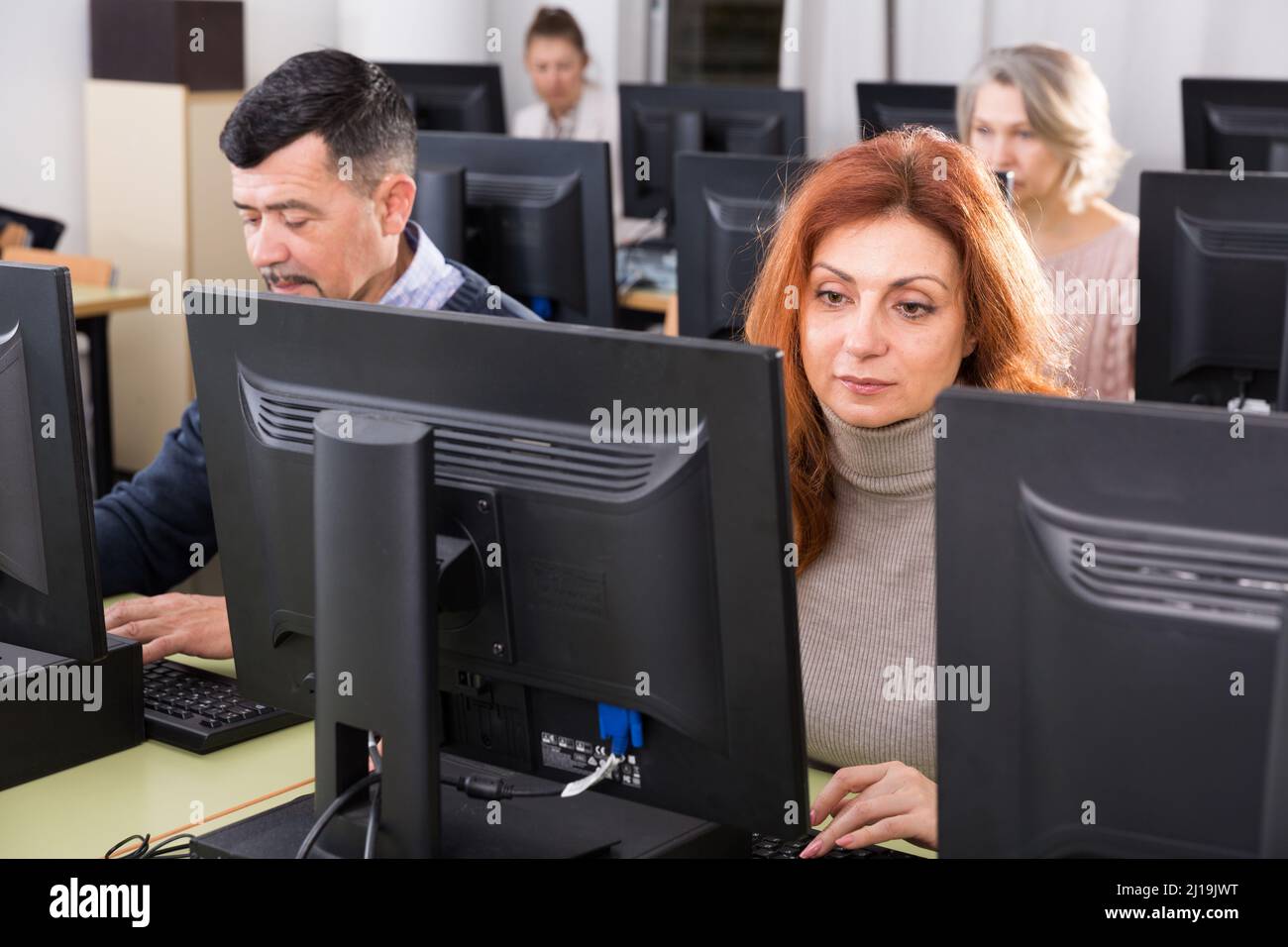 Middle aged woman educational hi-res stock photography and images - Alamy