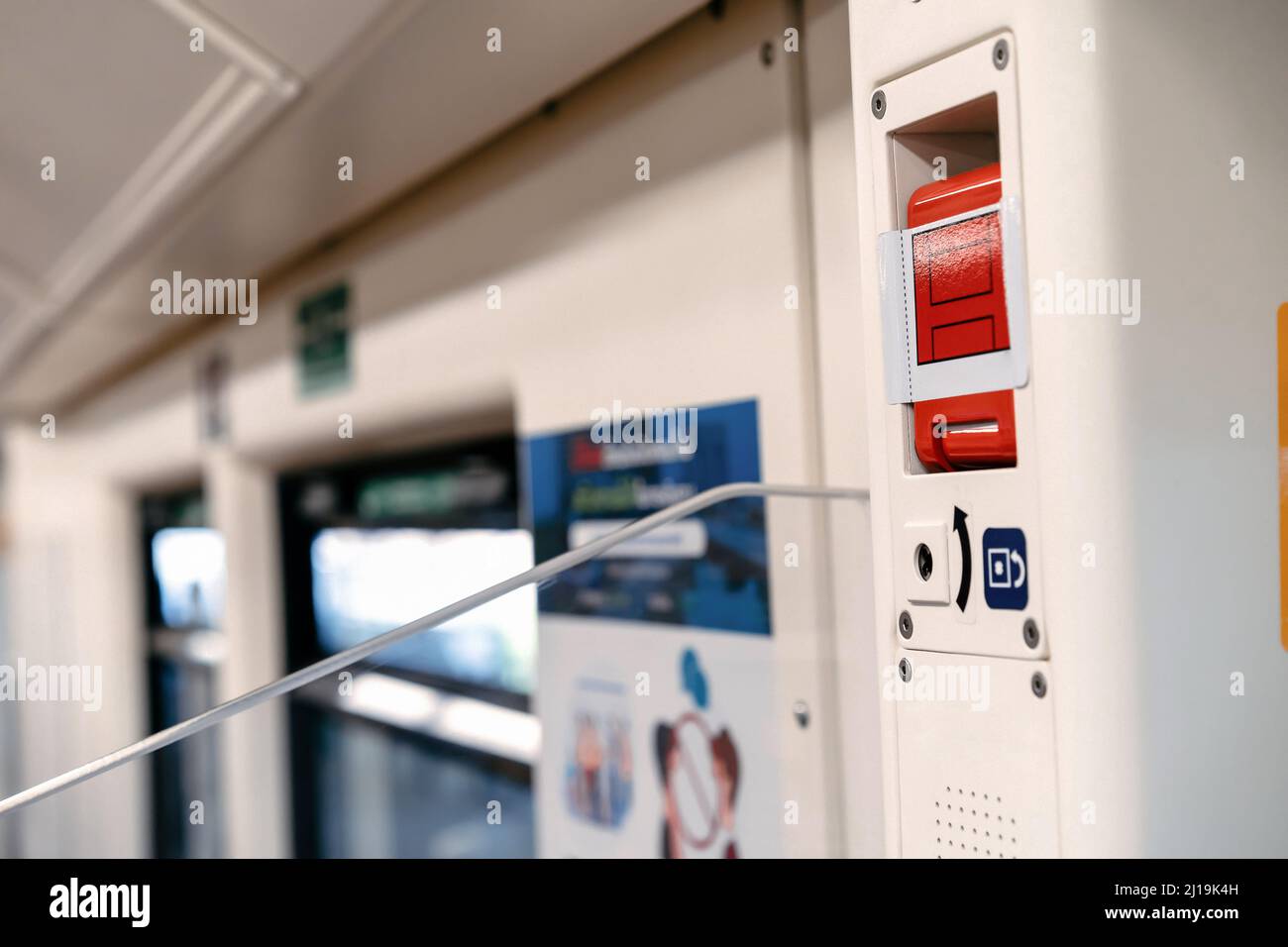 the red emergency door release switch control inside the sky train, it ...